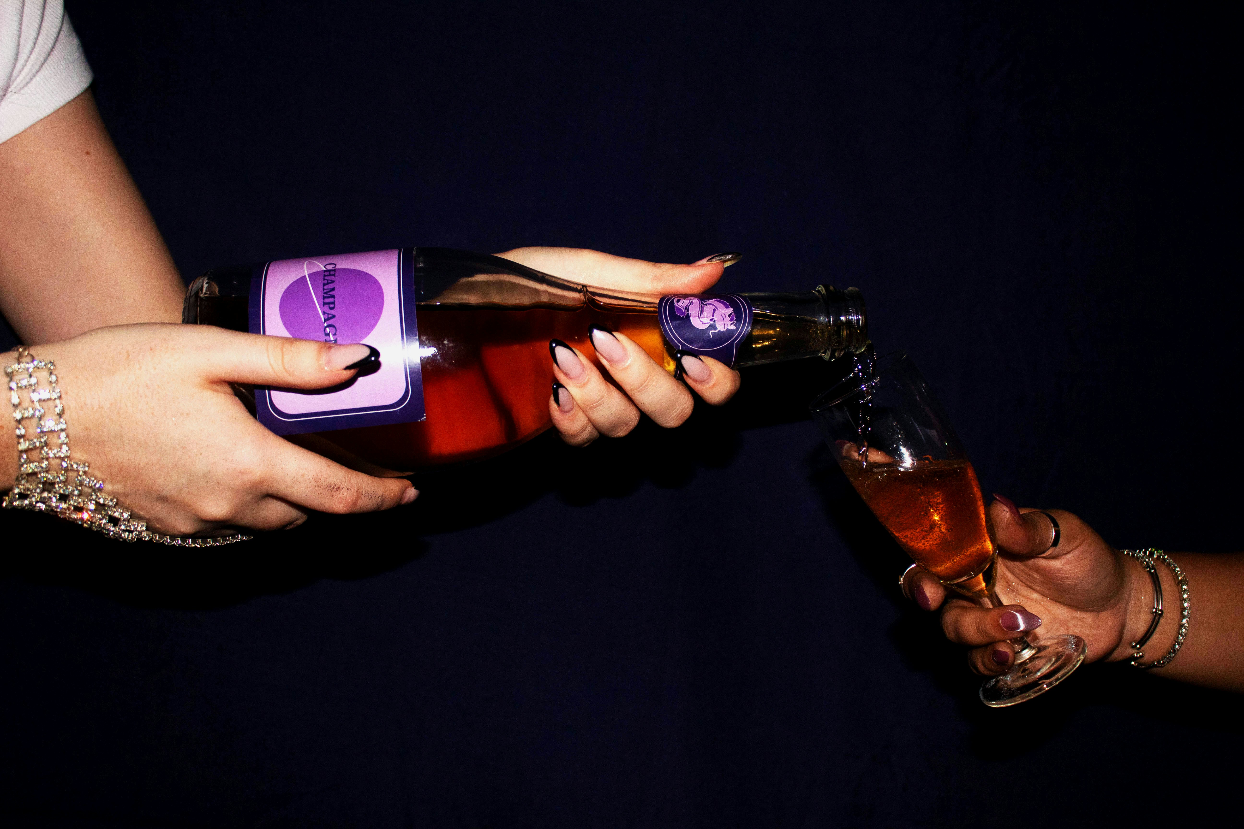 Velvet Night Toast: Two Hands, One Pour, A Quiet Champagne Moment