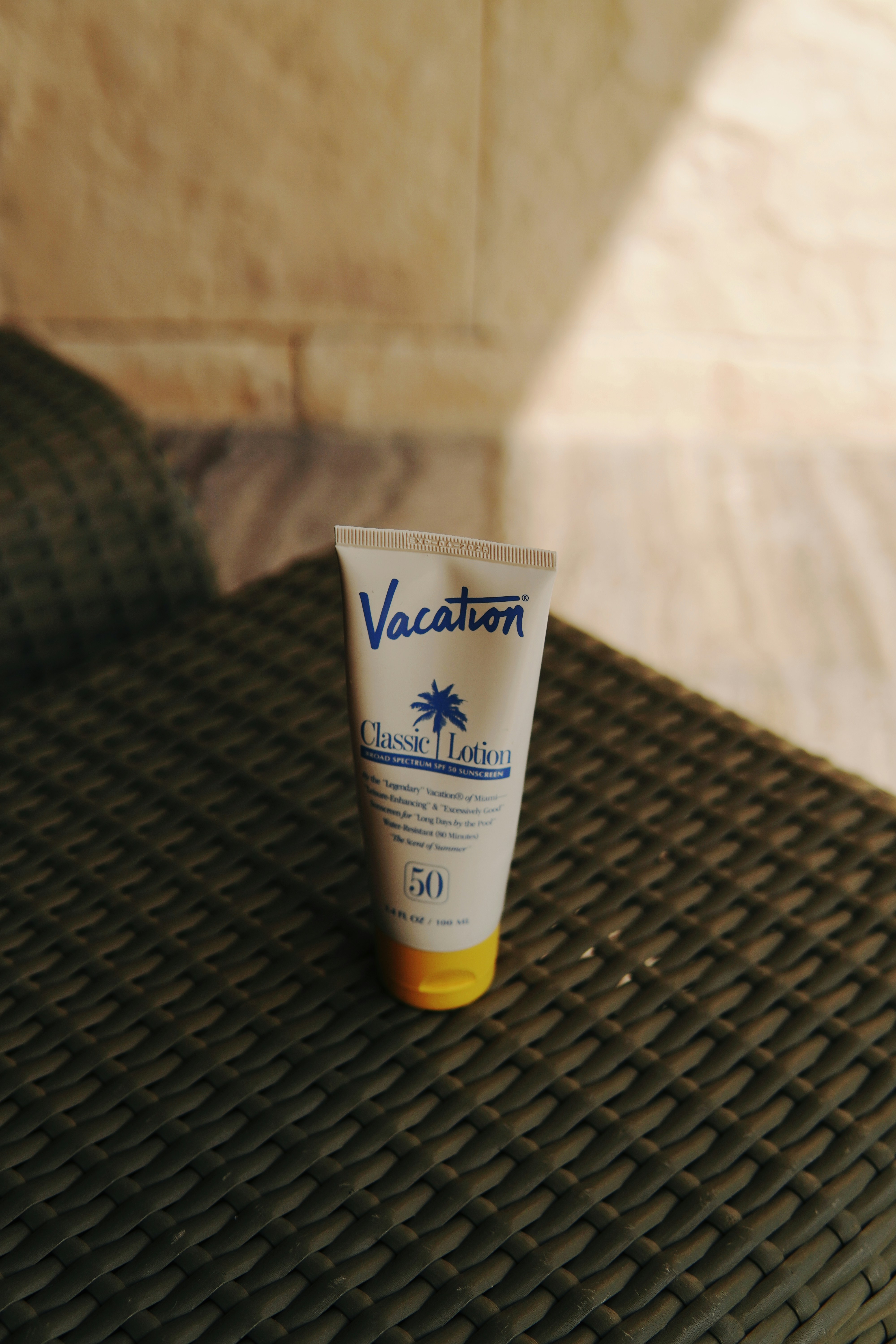 A tube of sunscreen sitting on top of a table photo – Free Mexico Image ...