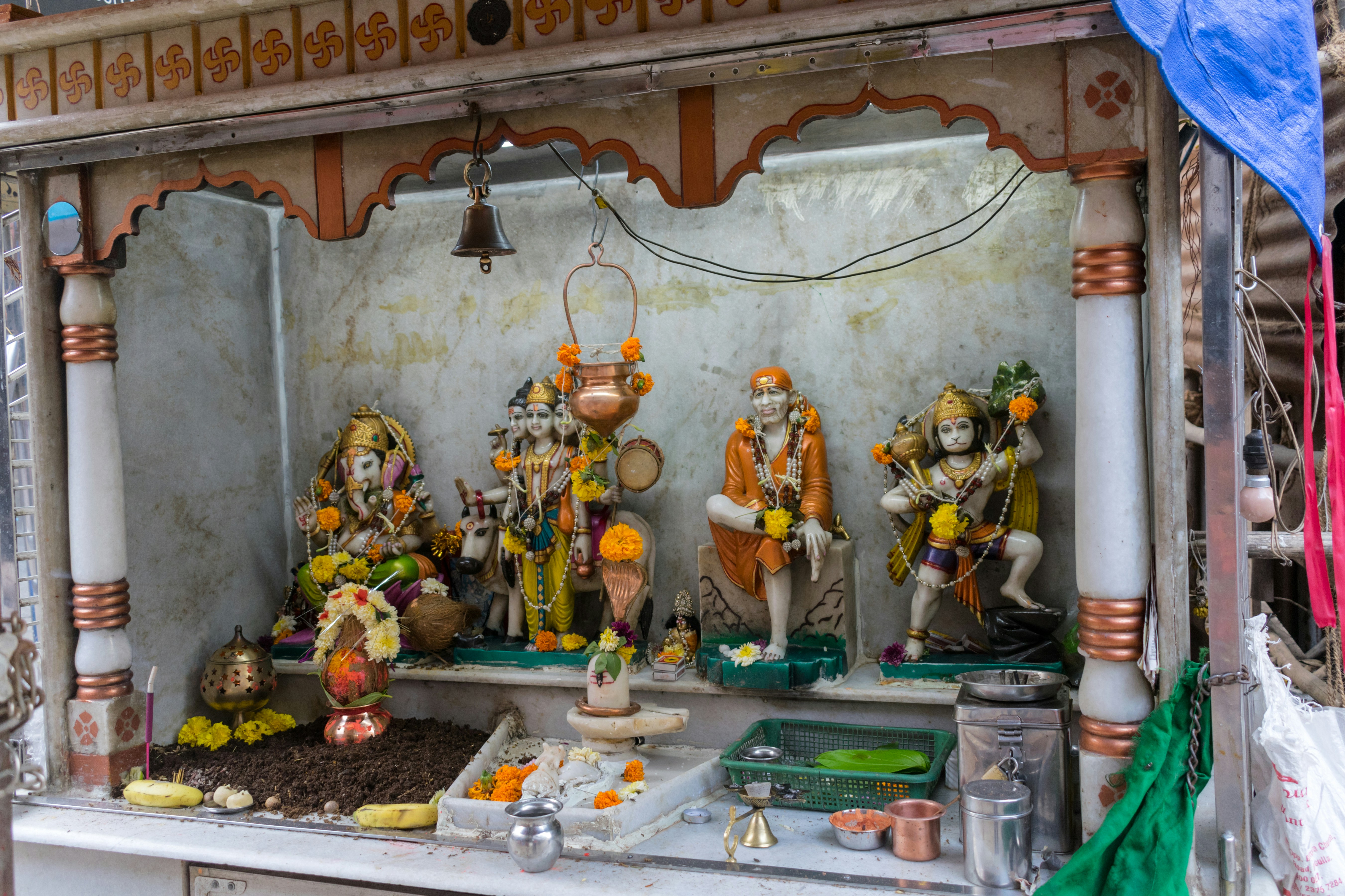 A shrine with statues of hindu deities in it photo – Free India Image ...