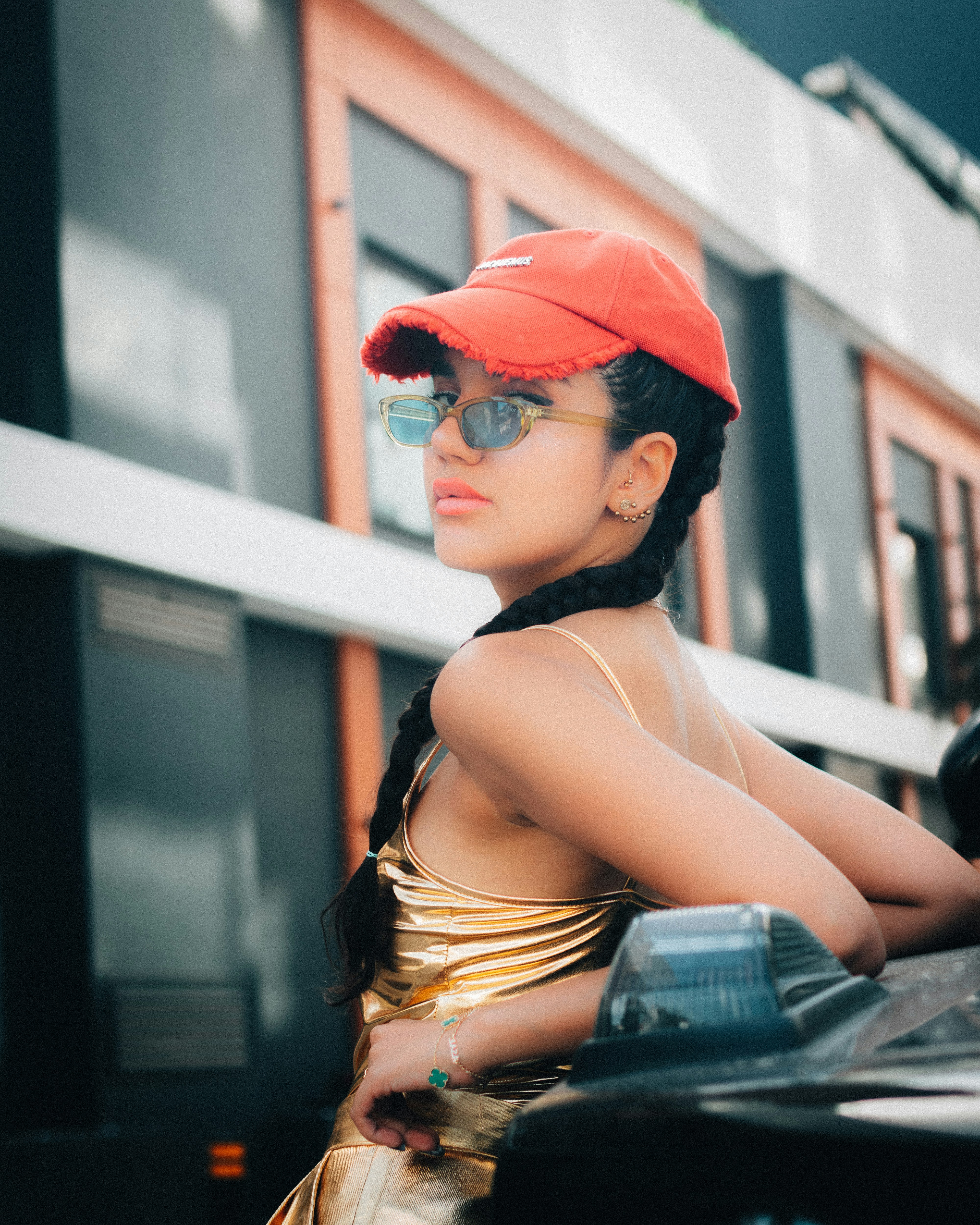A woman in a gold dress and a red hat photo – Free Portrait Image on ...