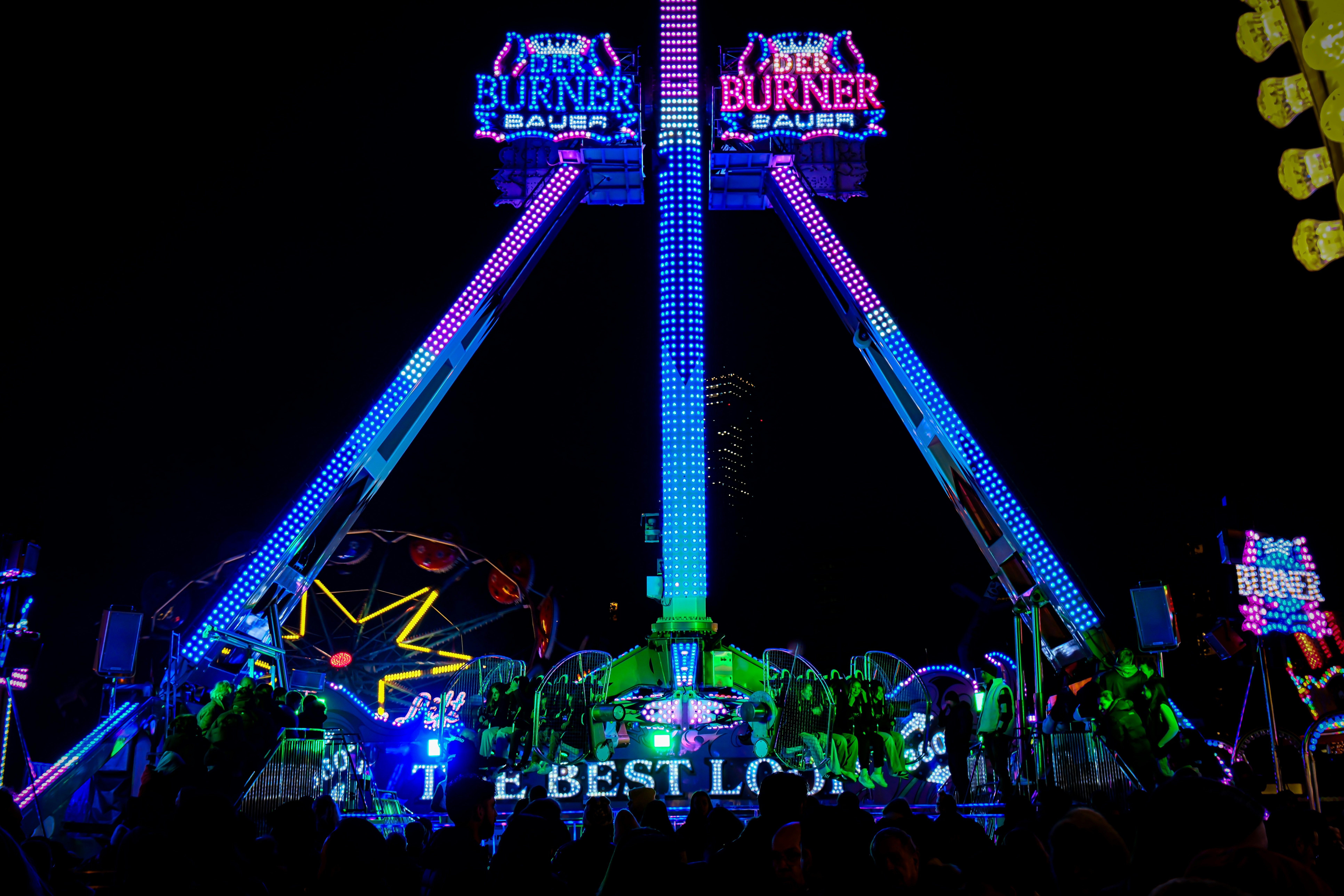 A ferris wheel lit up at night at a carnival photo – Free Basel Image ...
