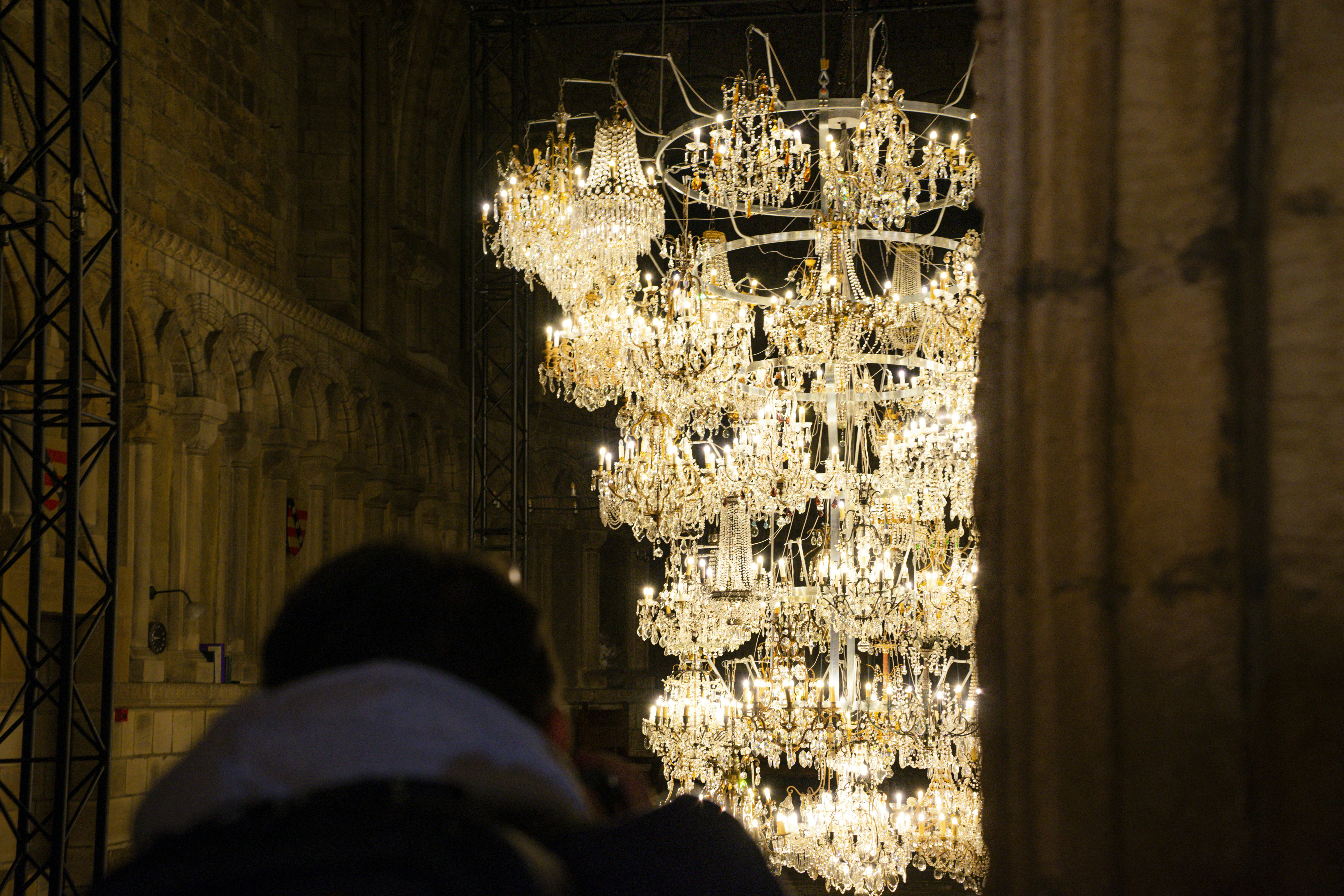 Chandelier Overlook: A Corridor of Light in the Shadowed Hall