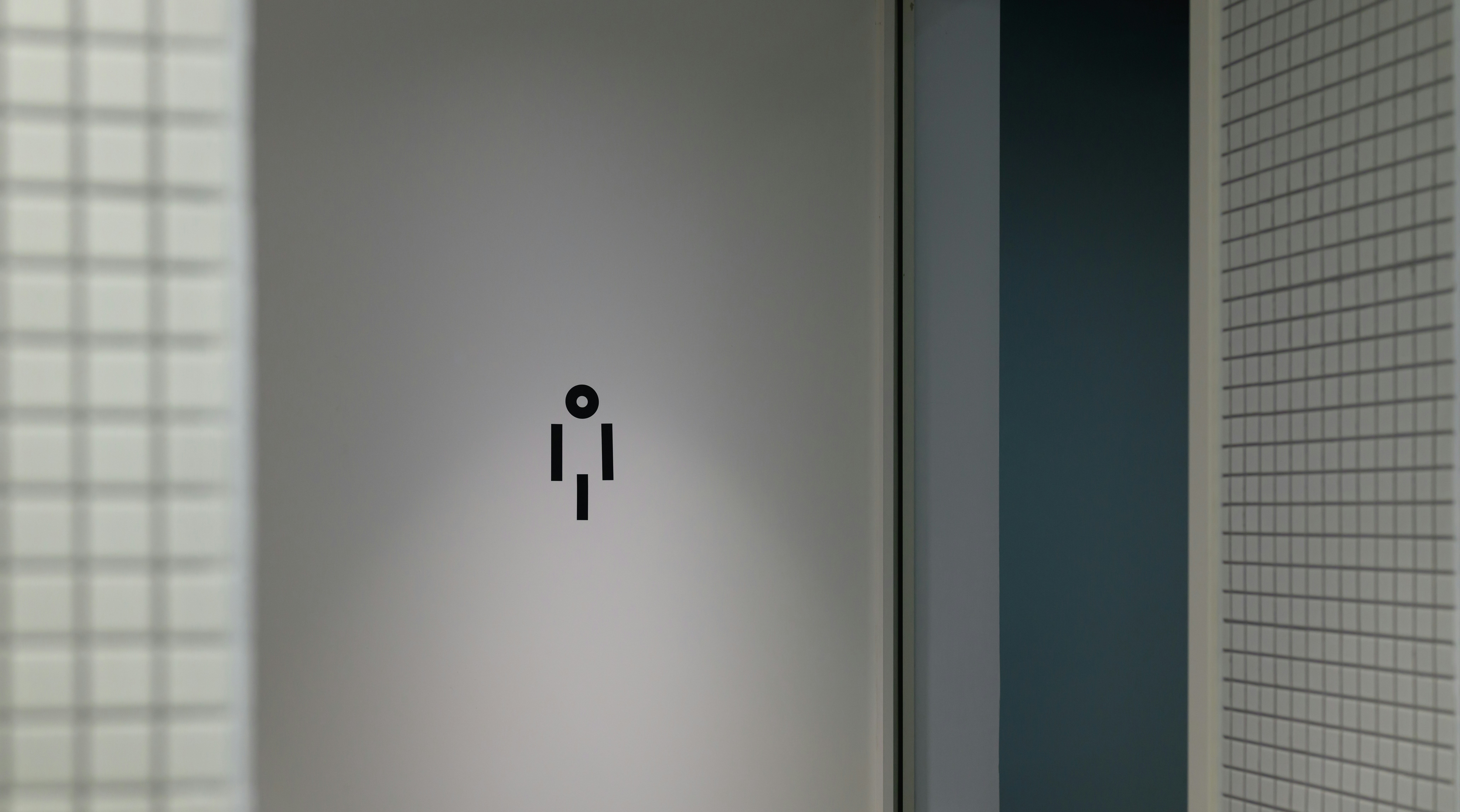 A male sign on the door