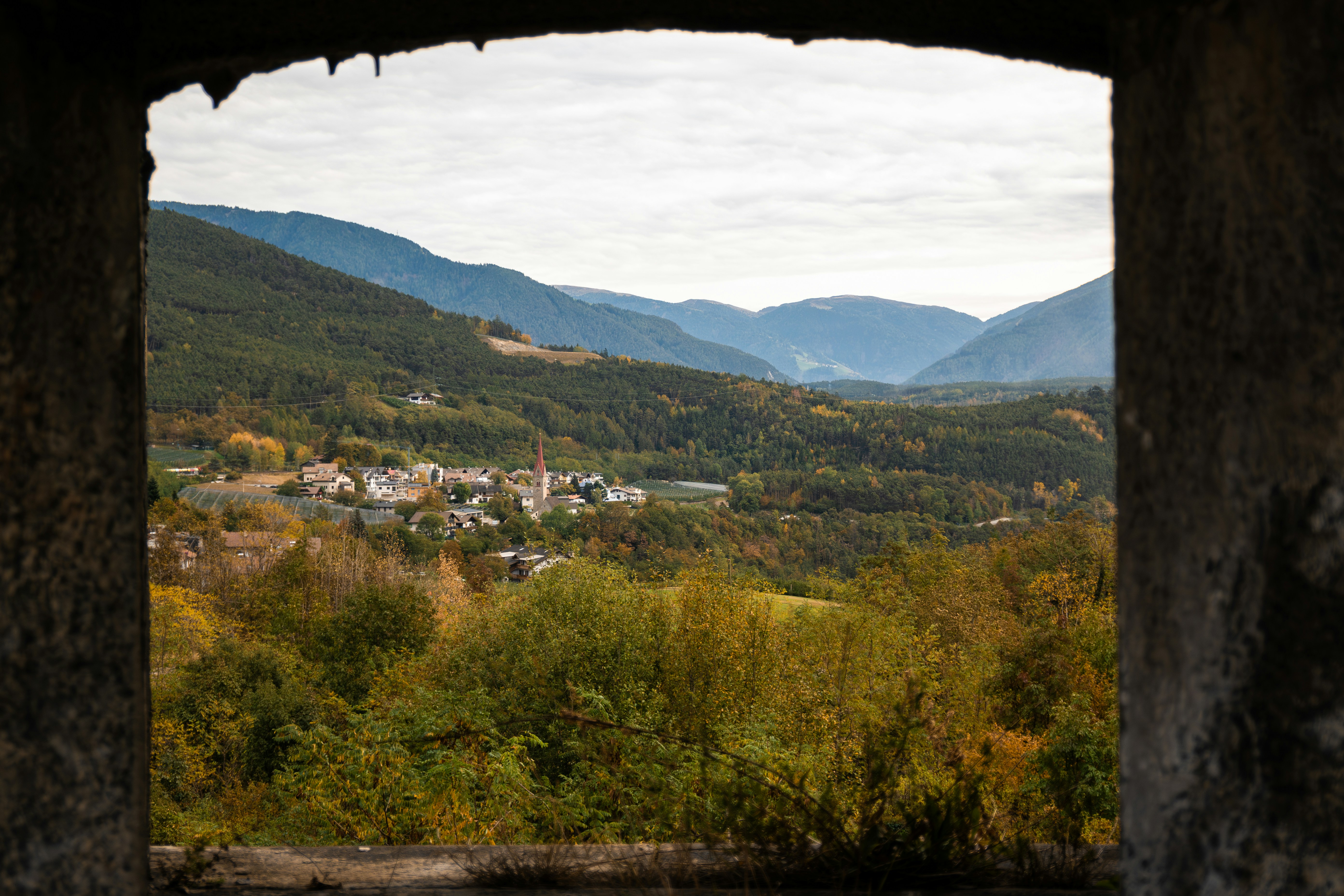 Valley Village Framed by Stone Window