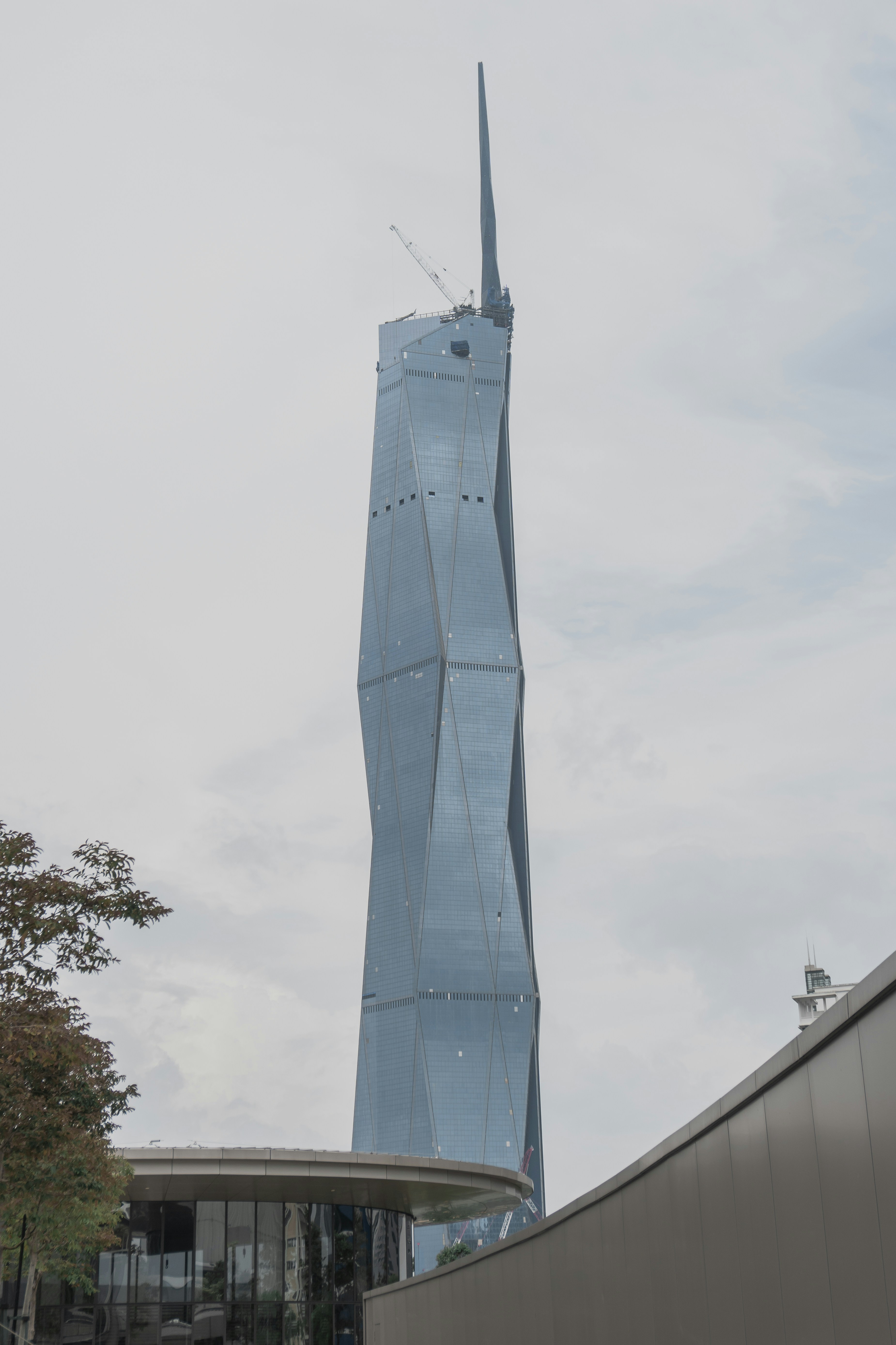 A very tall building with a very tall spire photo – Free Lalaport bukit ...
