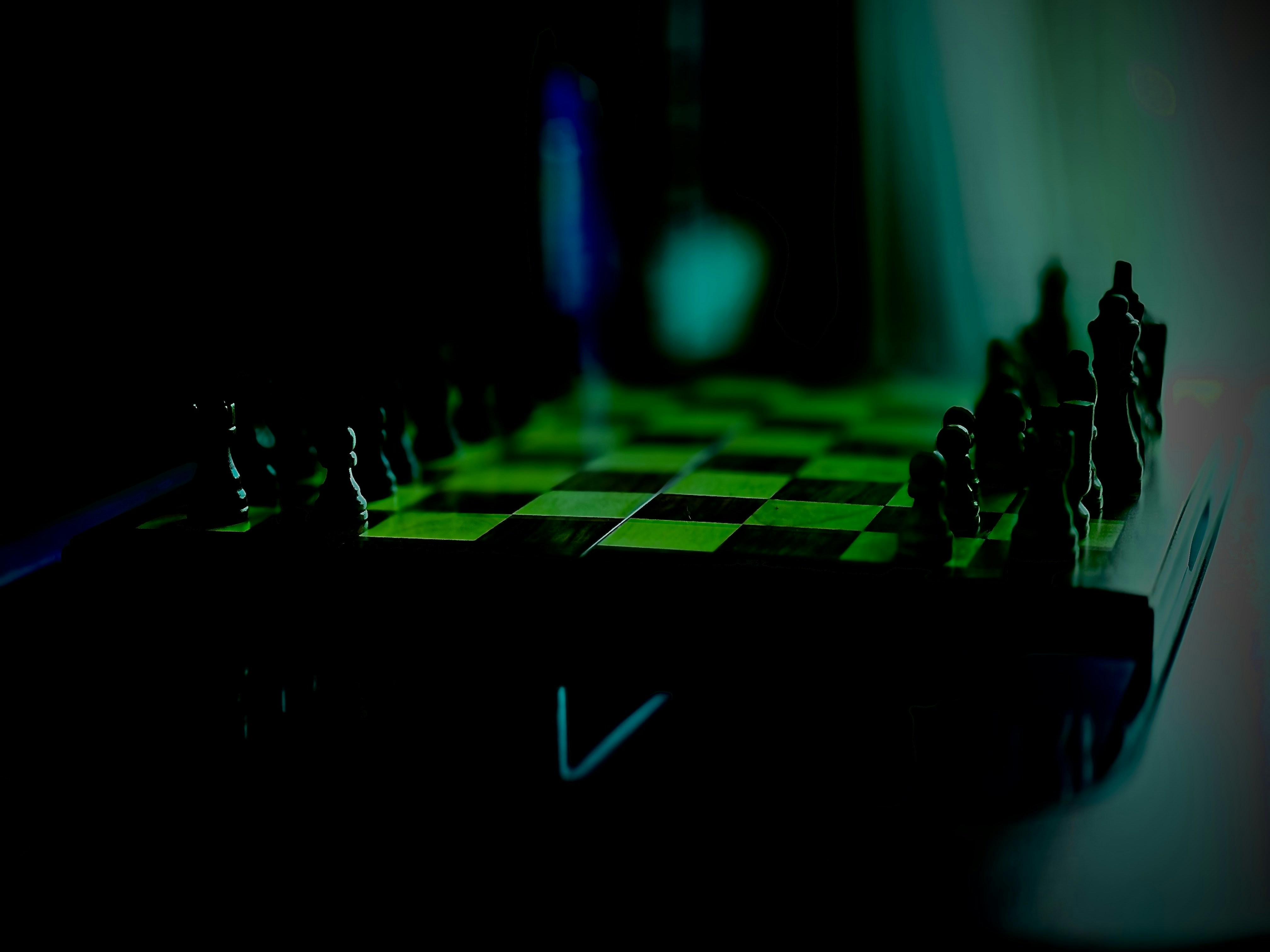 A black and green chess board with chess pieces on it photo – Free New ...