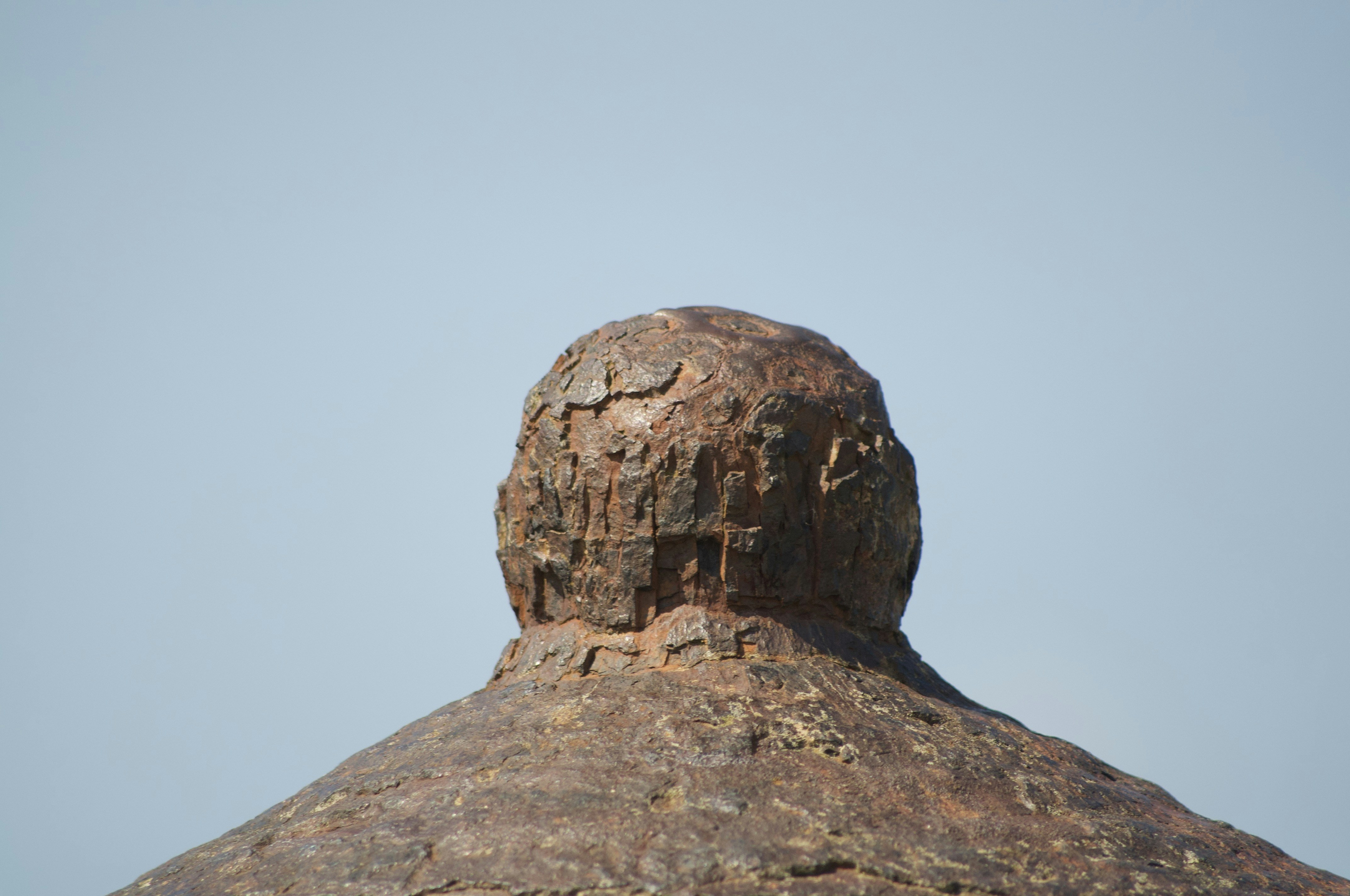 Rounded Summit Against a Calm Blue Sky