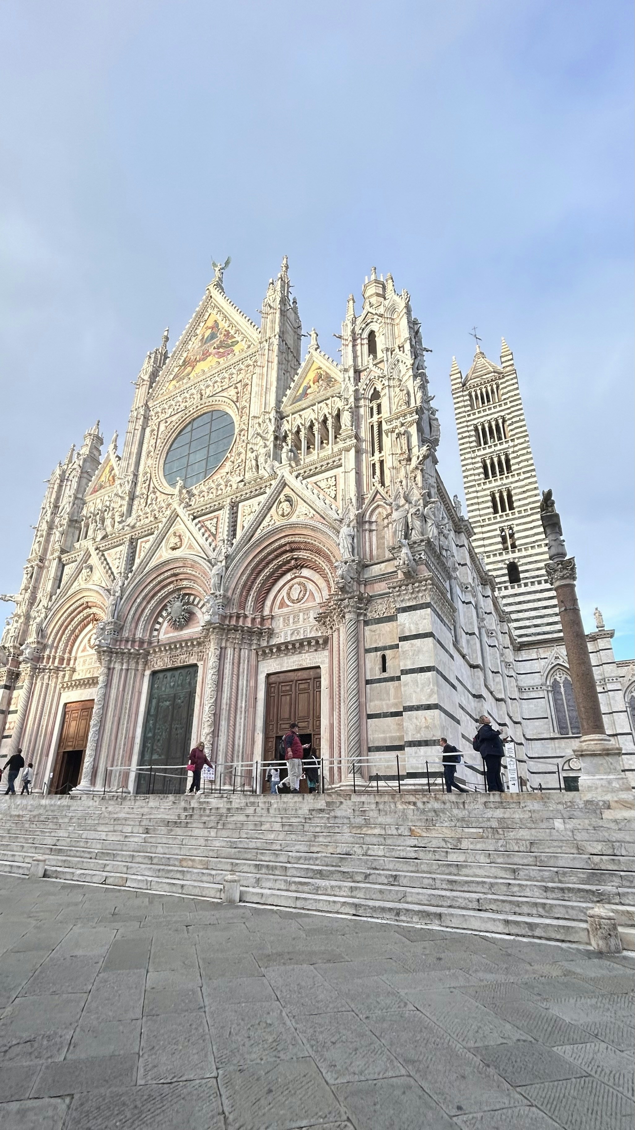 A large cathedral with stairs leading up to it photo – Free Building ...