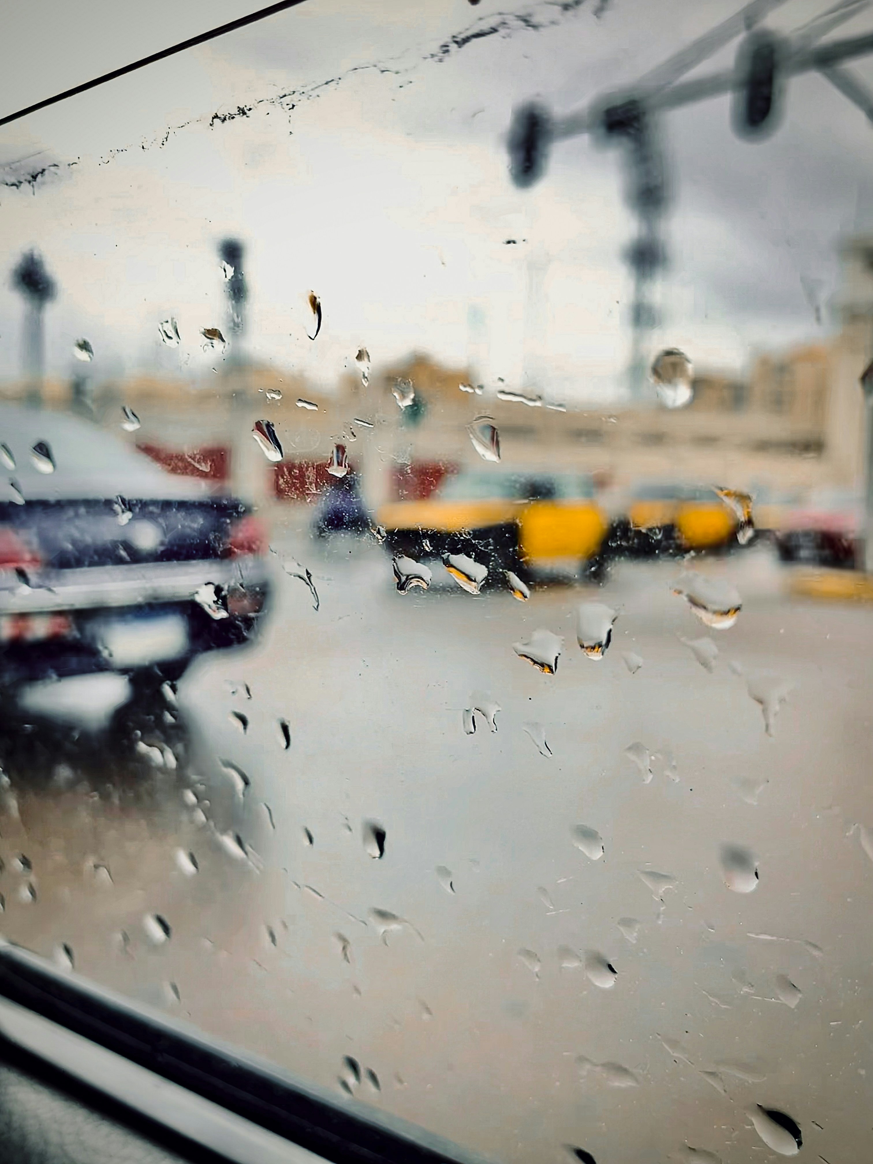 A rain covered window with a view of a parking lot photo – Free Egypt ...