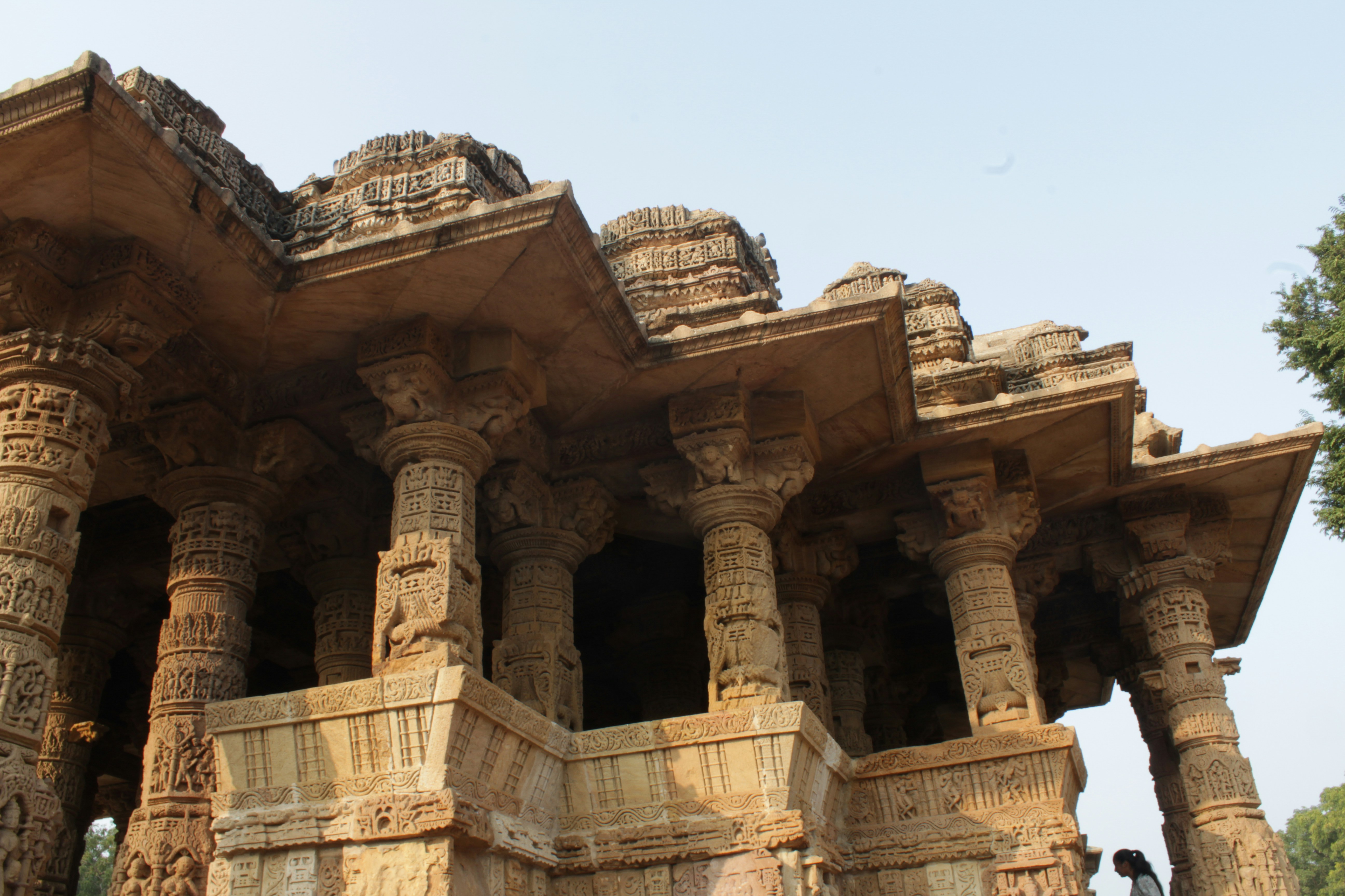 A large stone structure with many pillars photo – Free India Image on ...