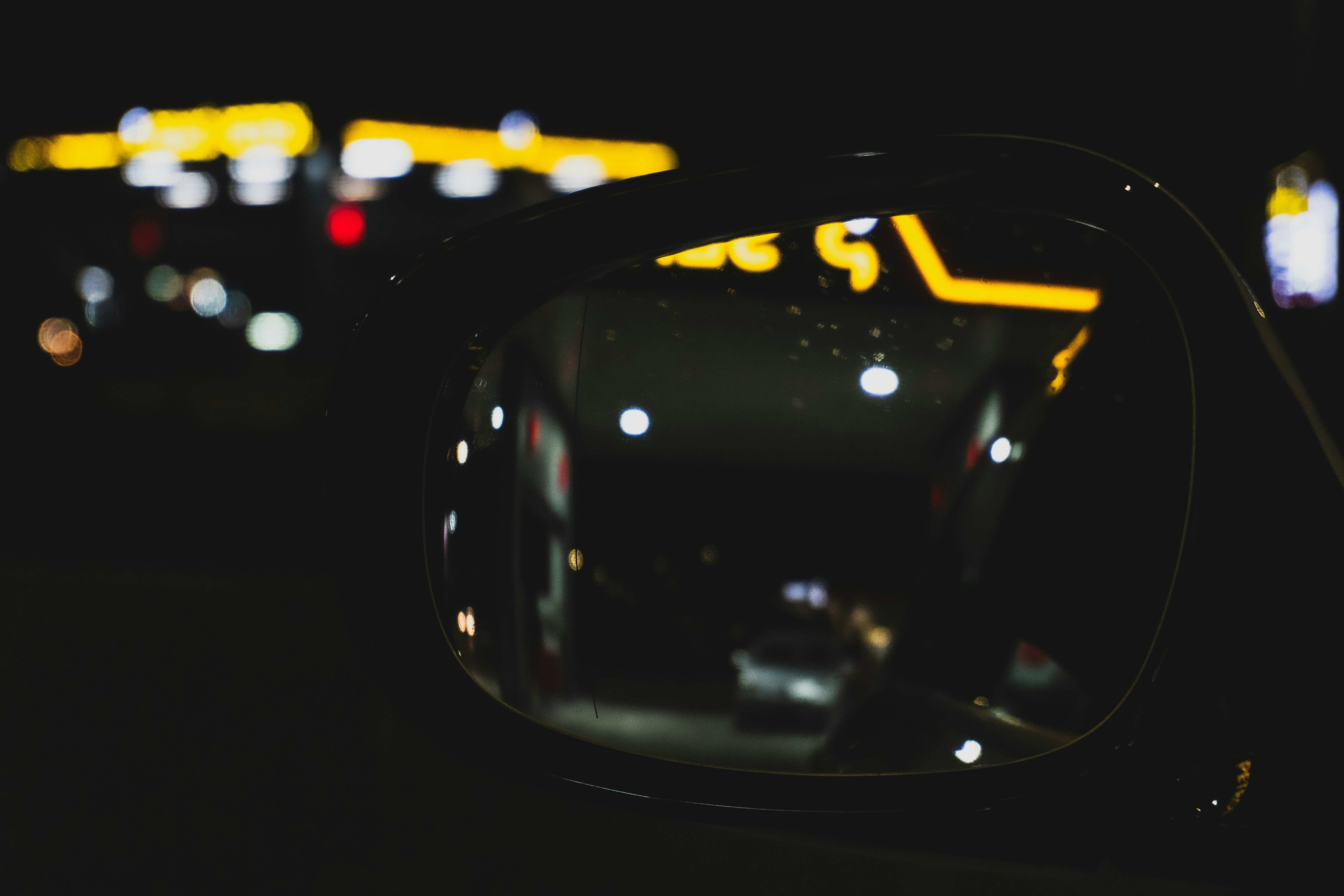 A car's side view mirror at night time photo – Free Car Image on Unsplash