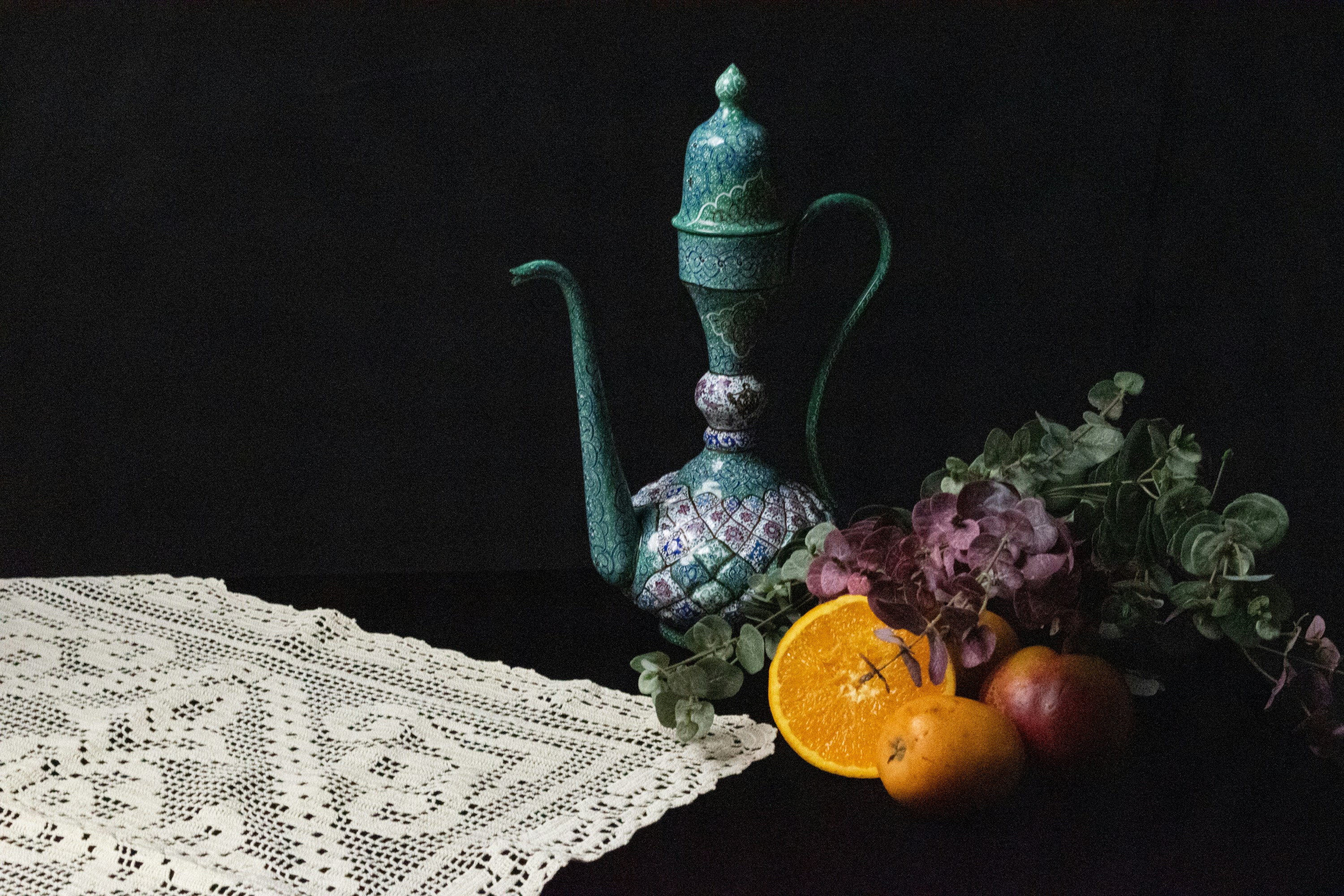 Teal Ewer in Velvet Light: Lace, Citrus, and Foliage
