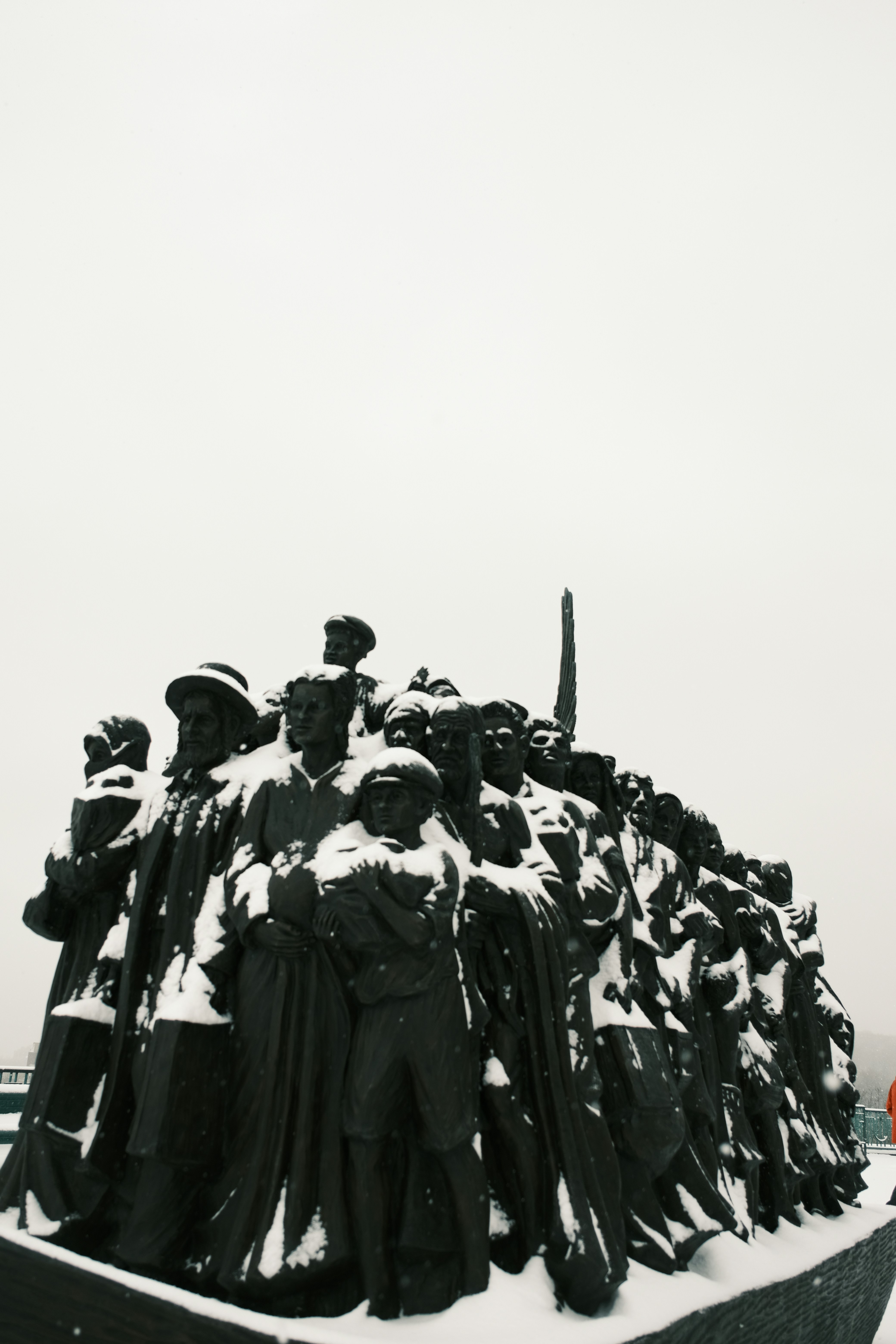Snowbound Assembly: A Monument of Silent Figures