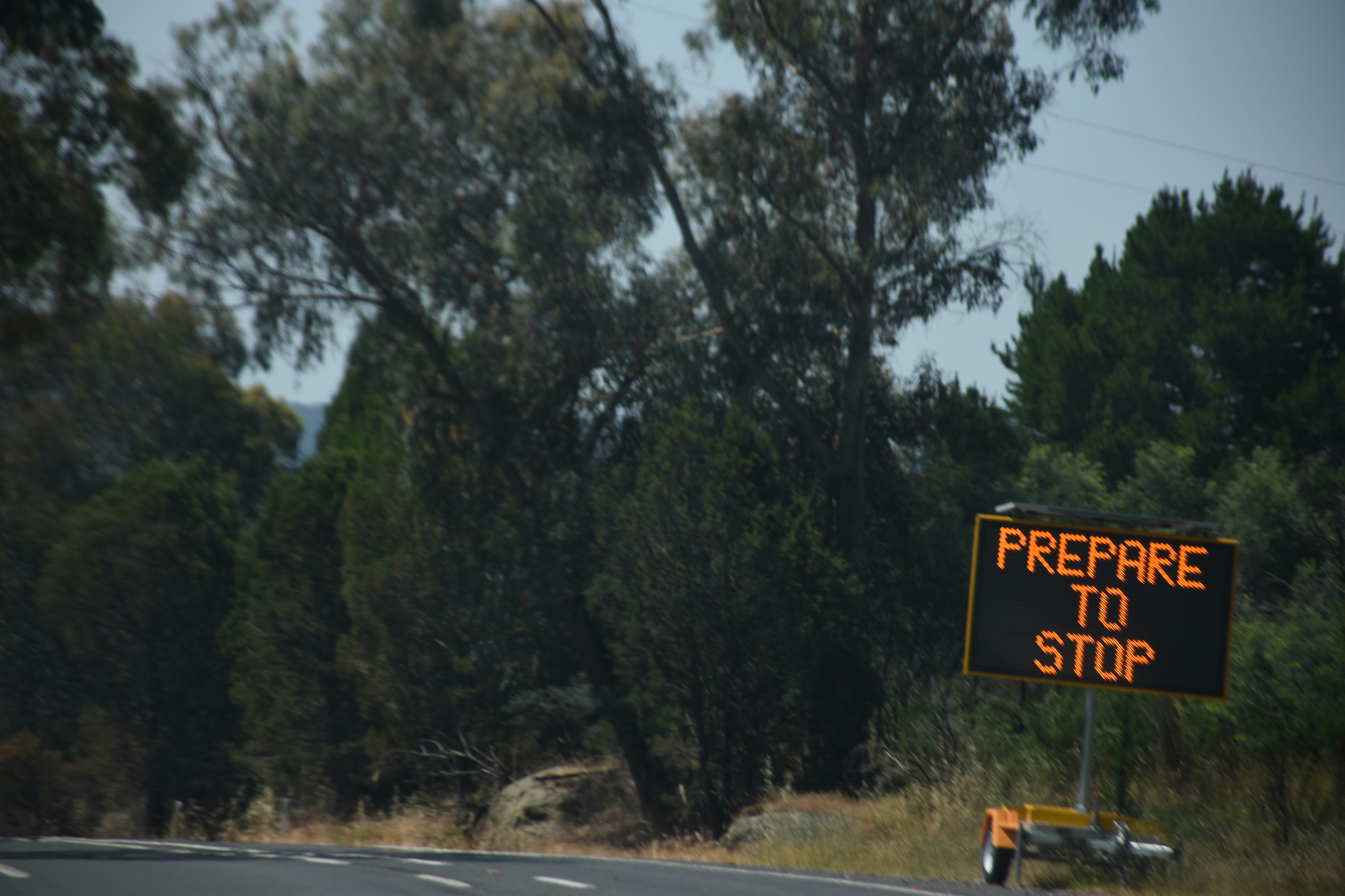 A sign that reads prepare to stop on the side of the road photo – Free ...