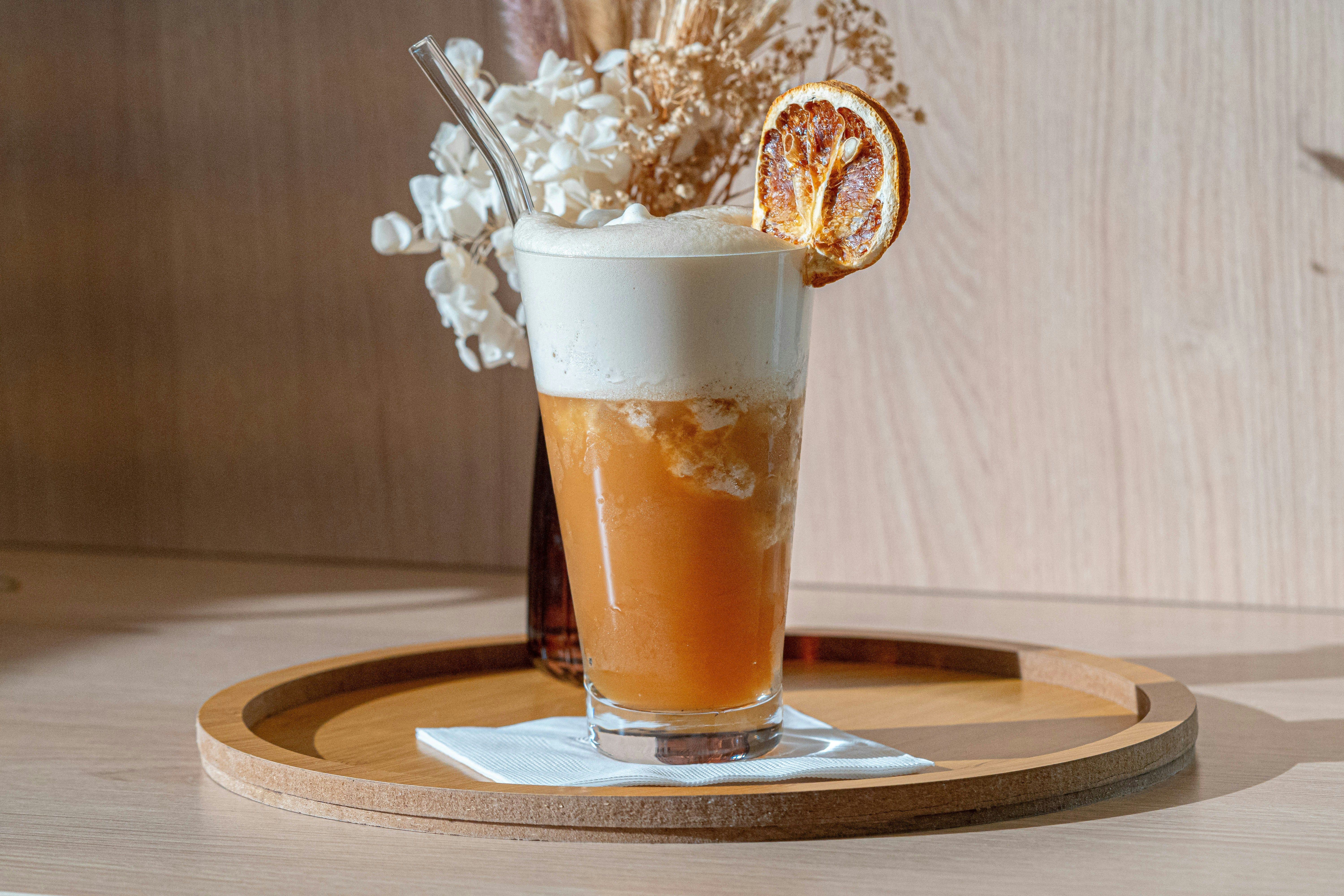 Foamy Citrus Chill on a Wooden Tray
