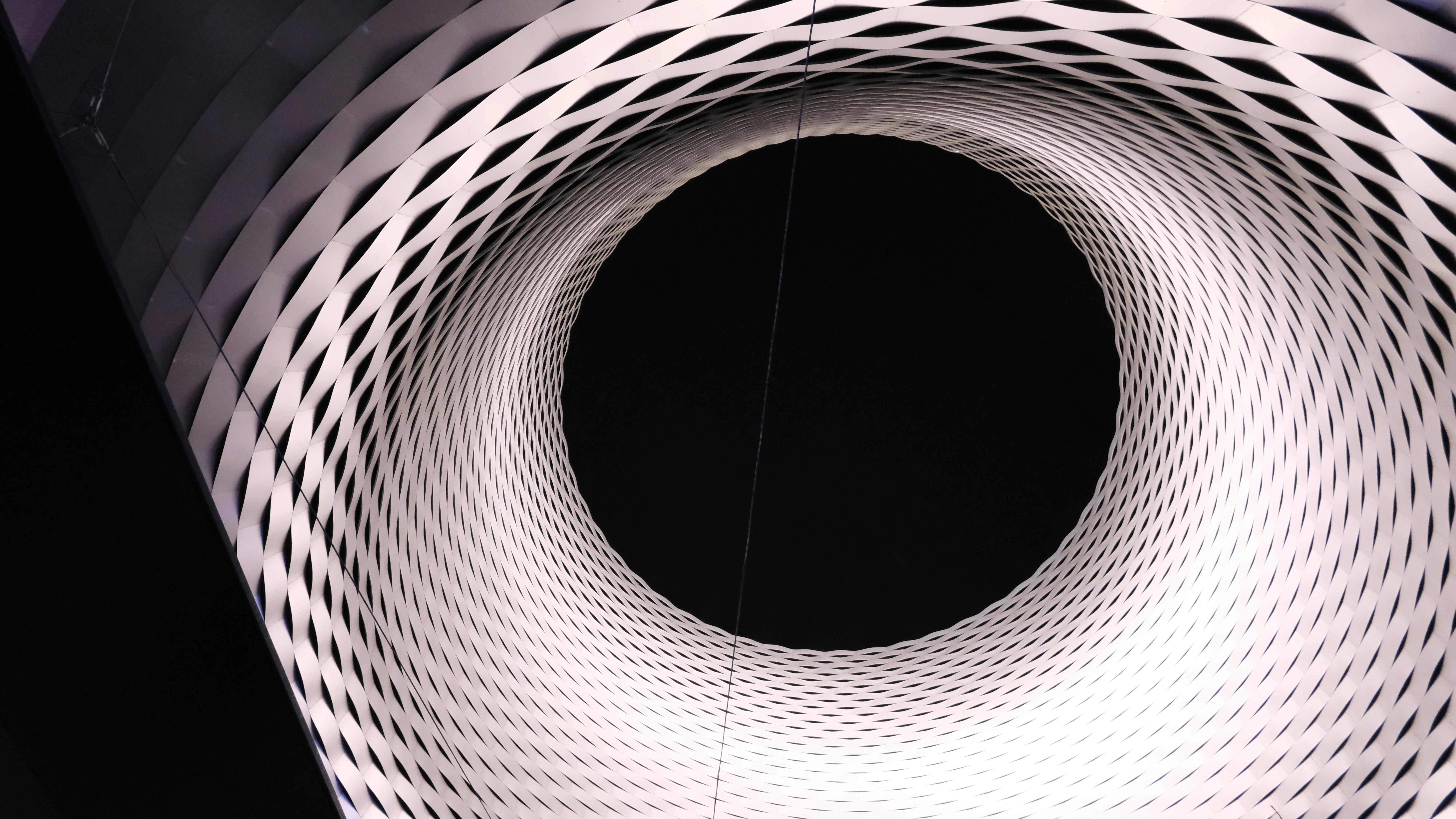 Spiral Atrium: Light and Lattice in Circular Silence