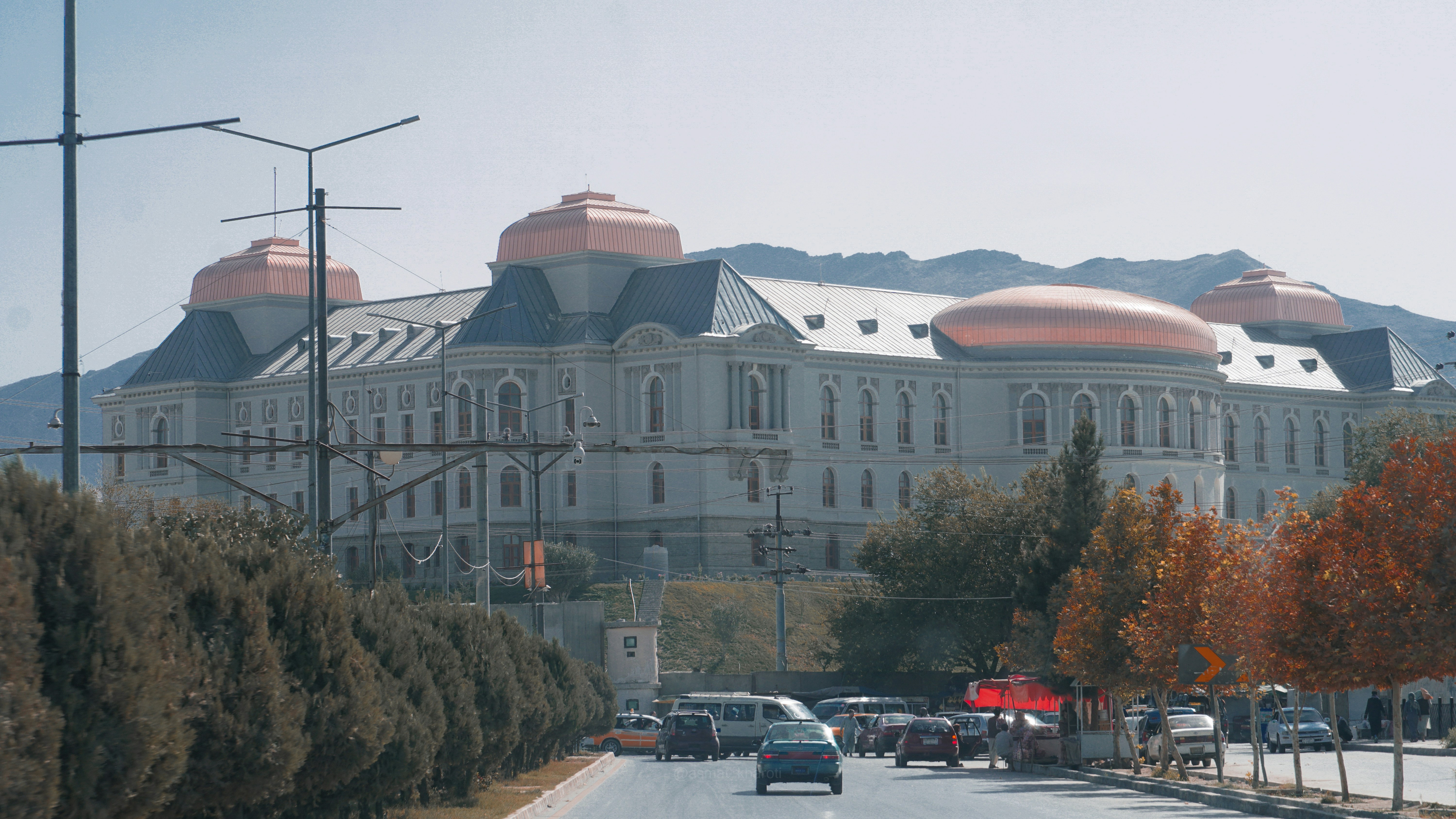 Darul Aman Palace #beautyofafghanistan #ancientafghanistan | a large white building on the side of a road