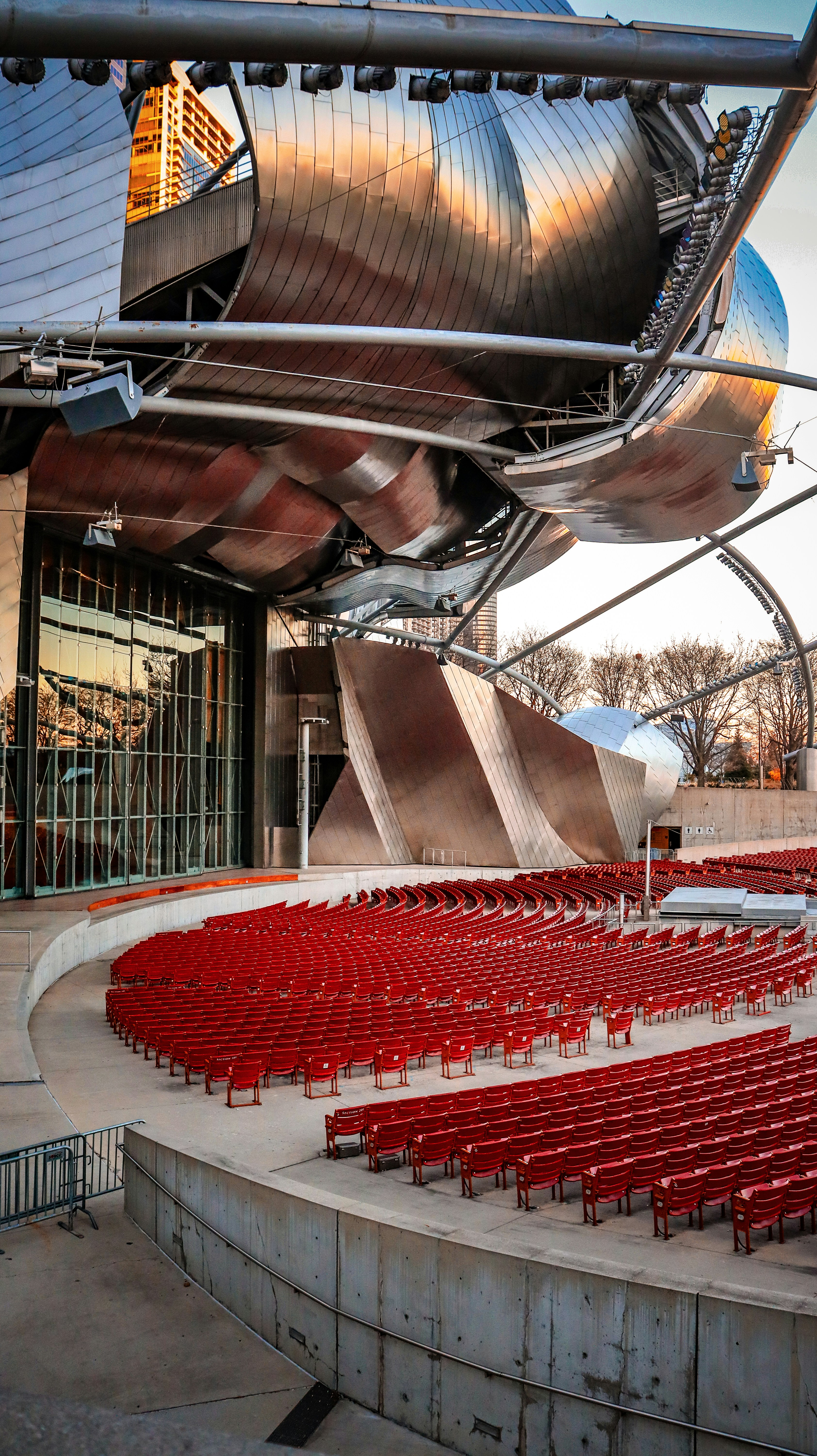 Echoes of Chrome and Crimson: A Modern Amphitheater Under a Sculpted Canopy