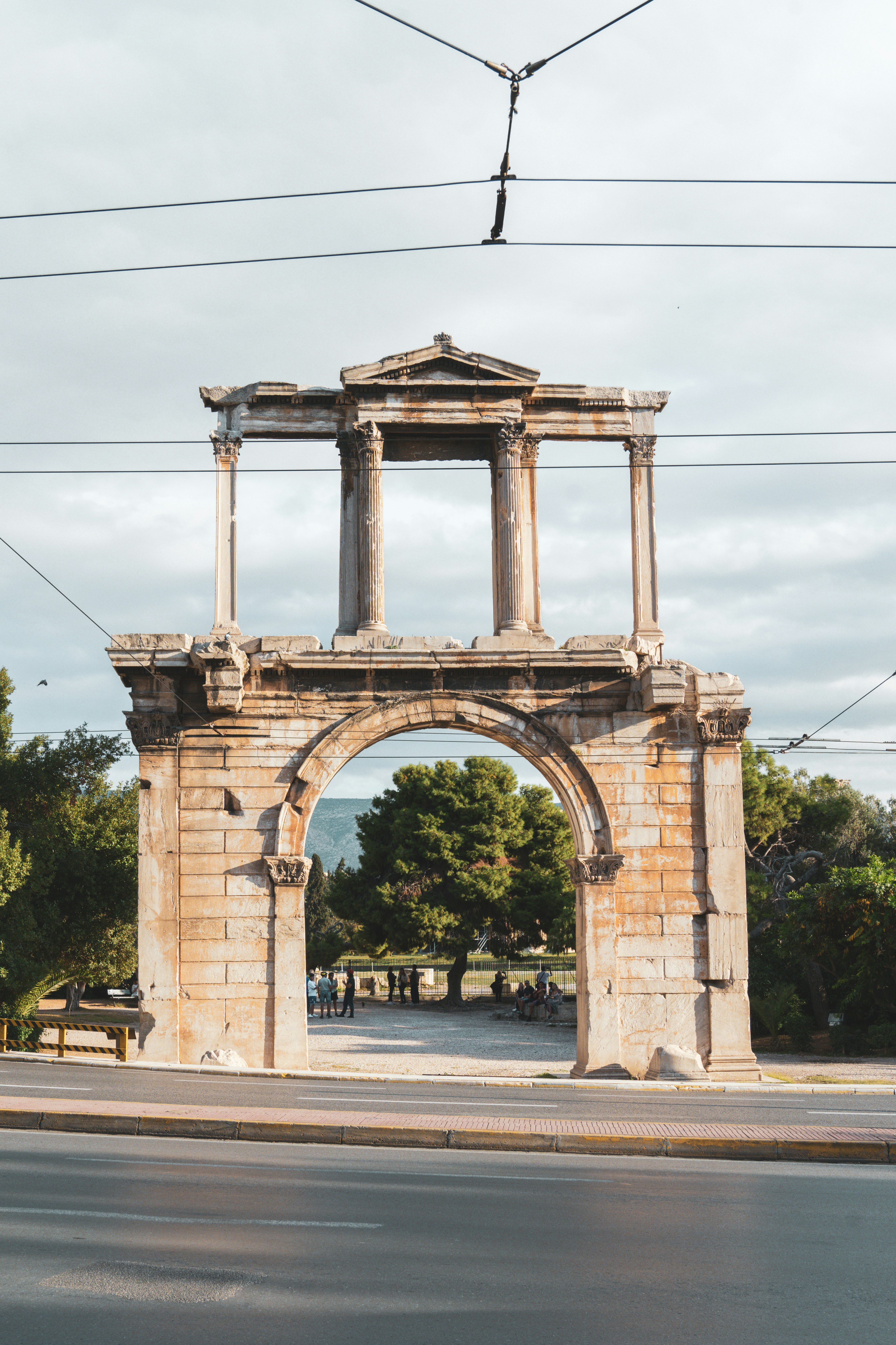 a large stone structure sitting on the side of a road