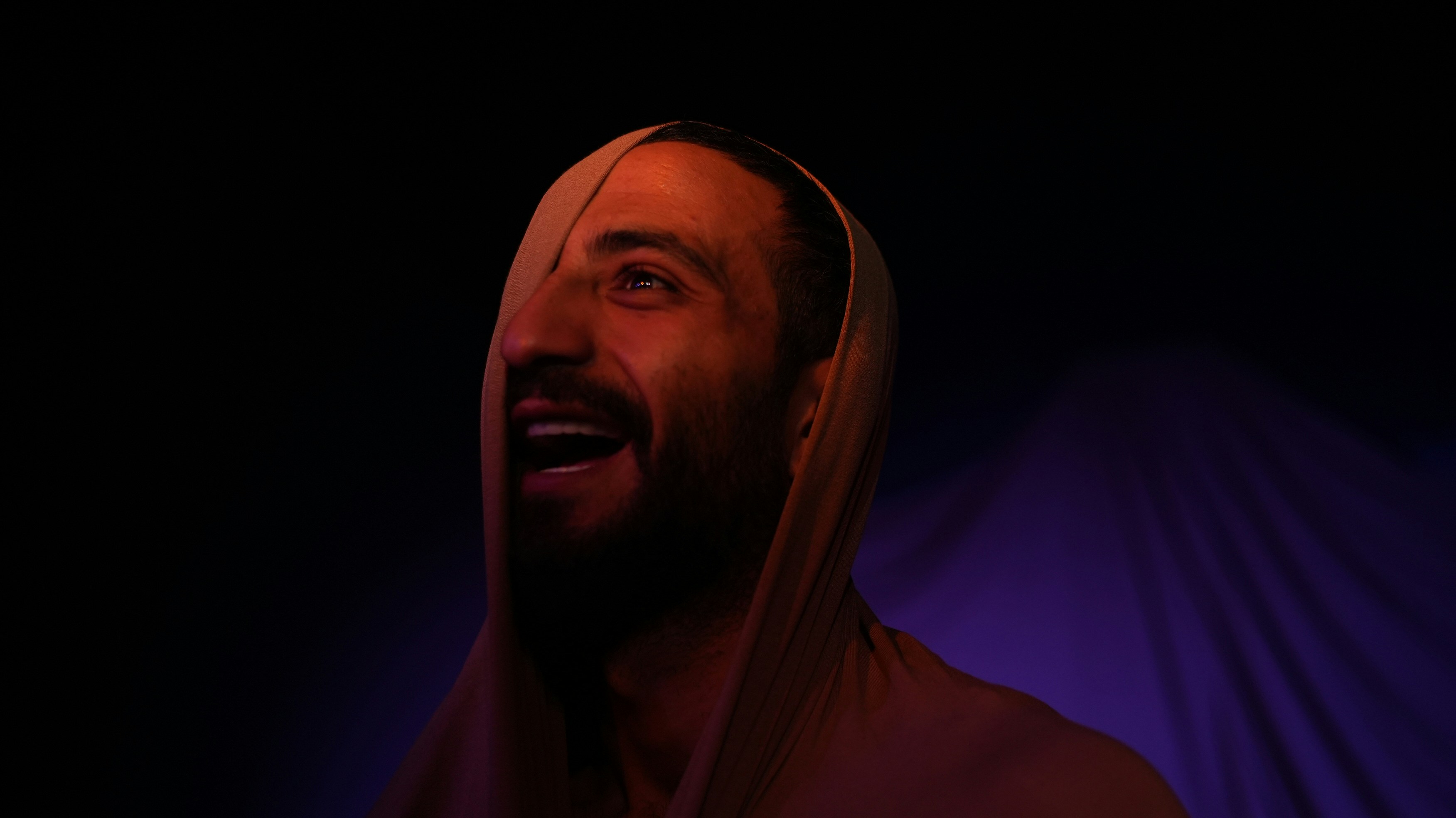 A man with a hood over his head photo – Free Person Image on Unsplash