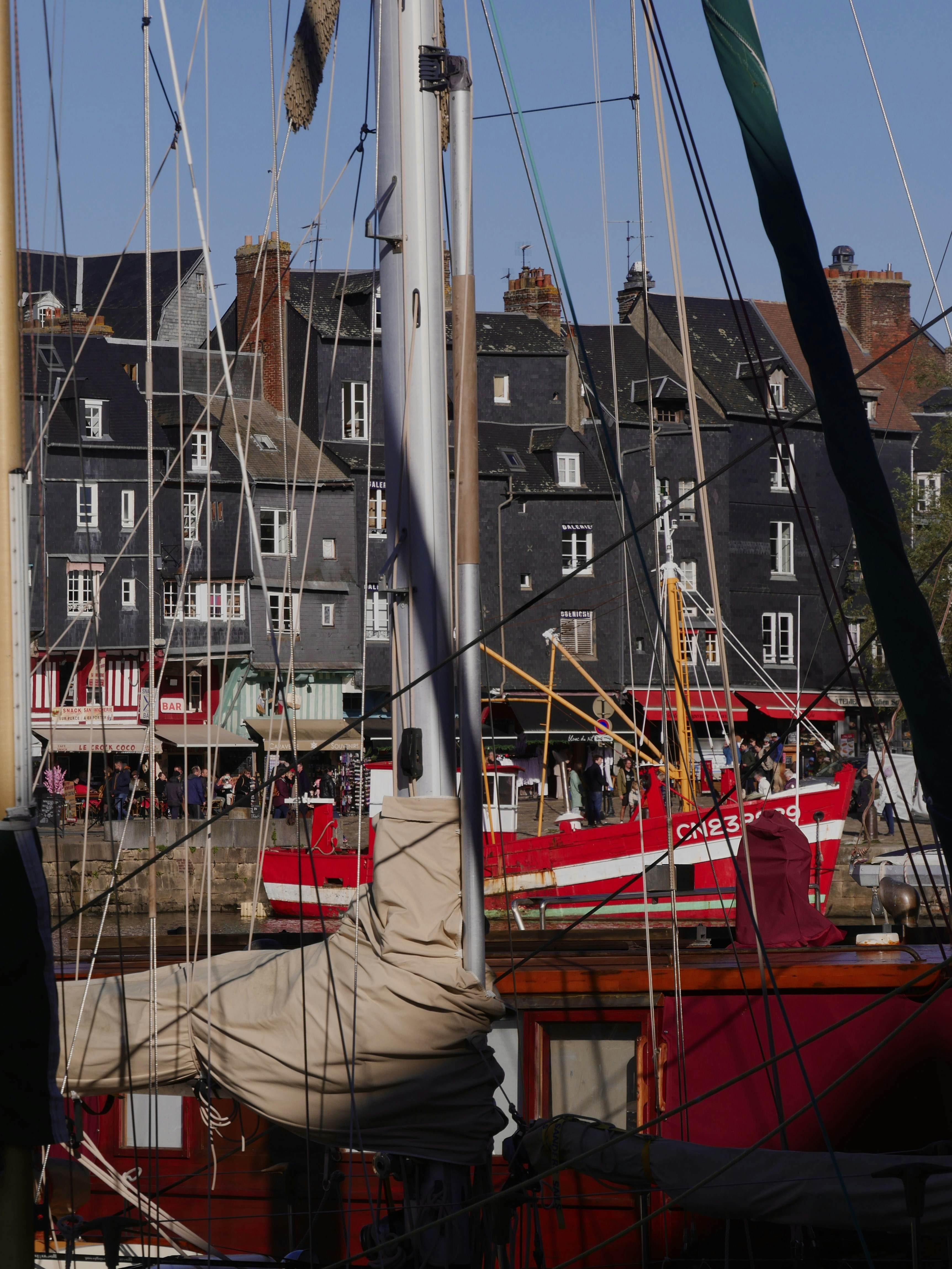 A group of boats that are sitting in the water photo – Free Human Image ...