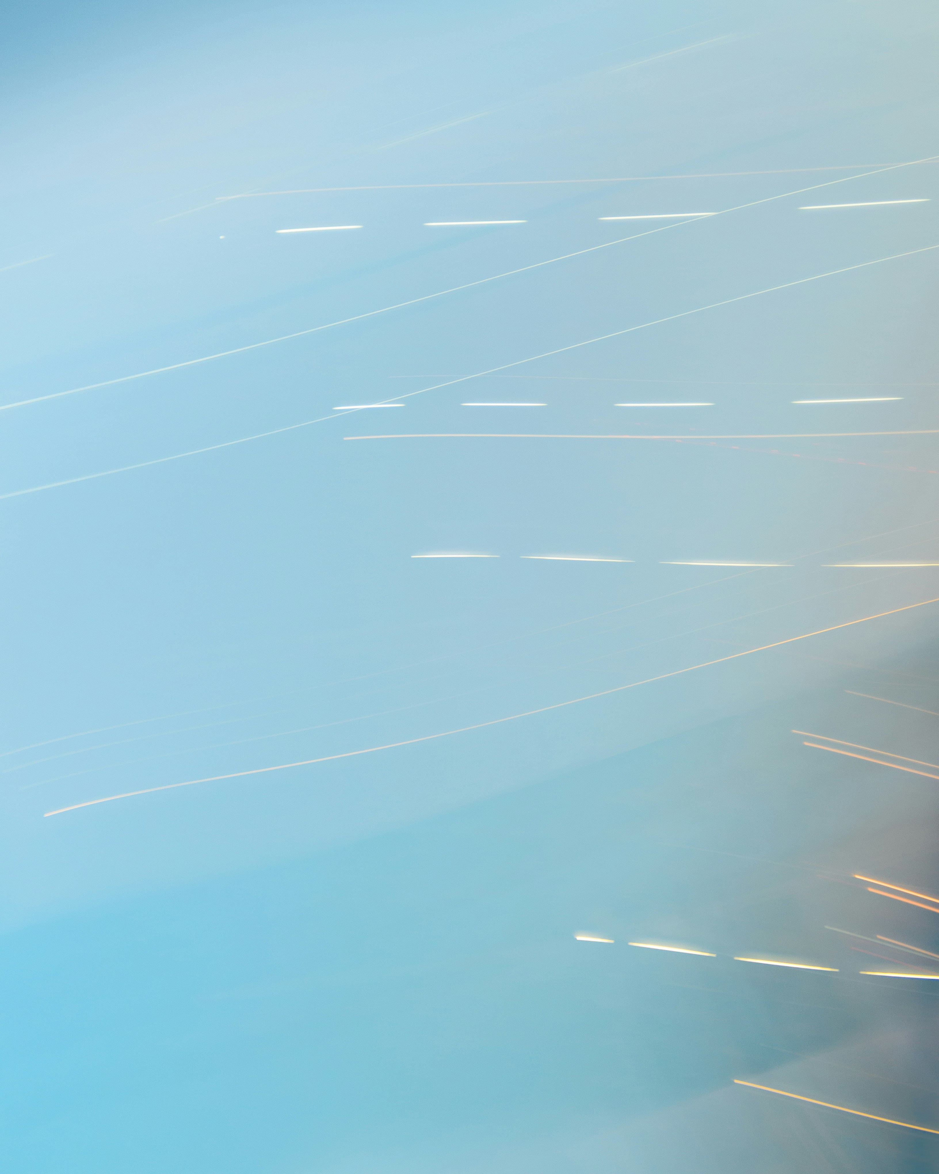 A blurry photo of a plane flying in the sky photo – Free Blue Image on ...