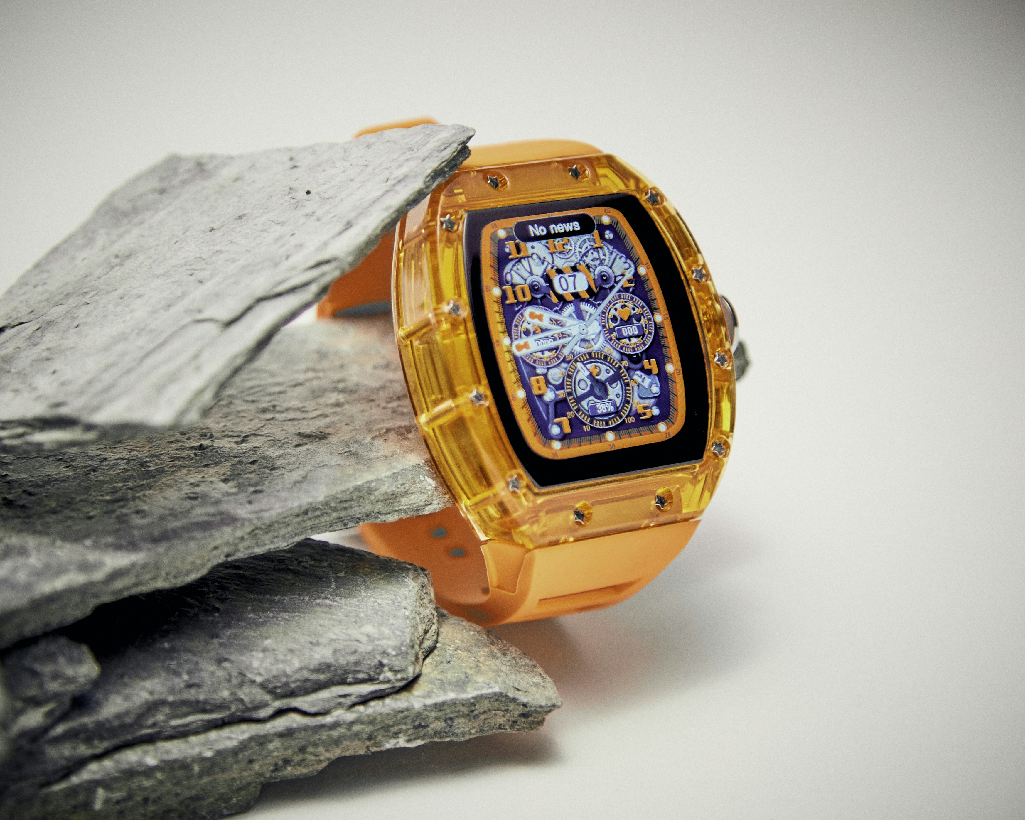 Amber Skeleton Watch Resting Among Slate Fragments