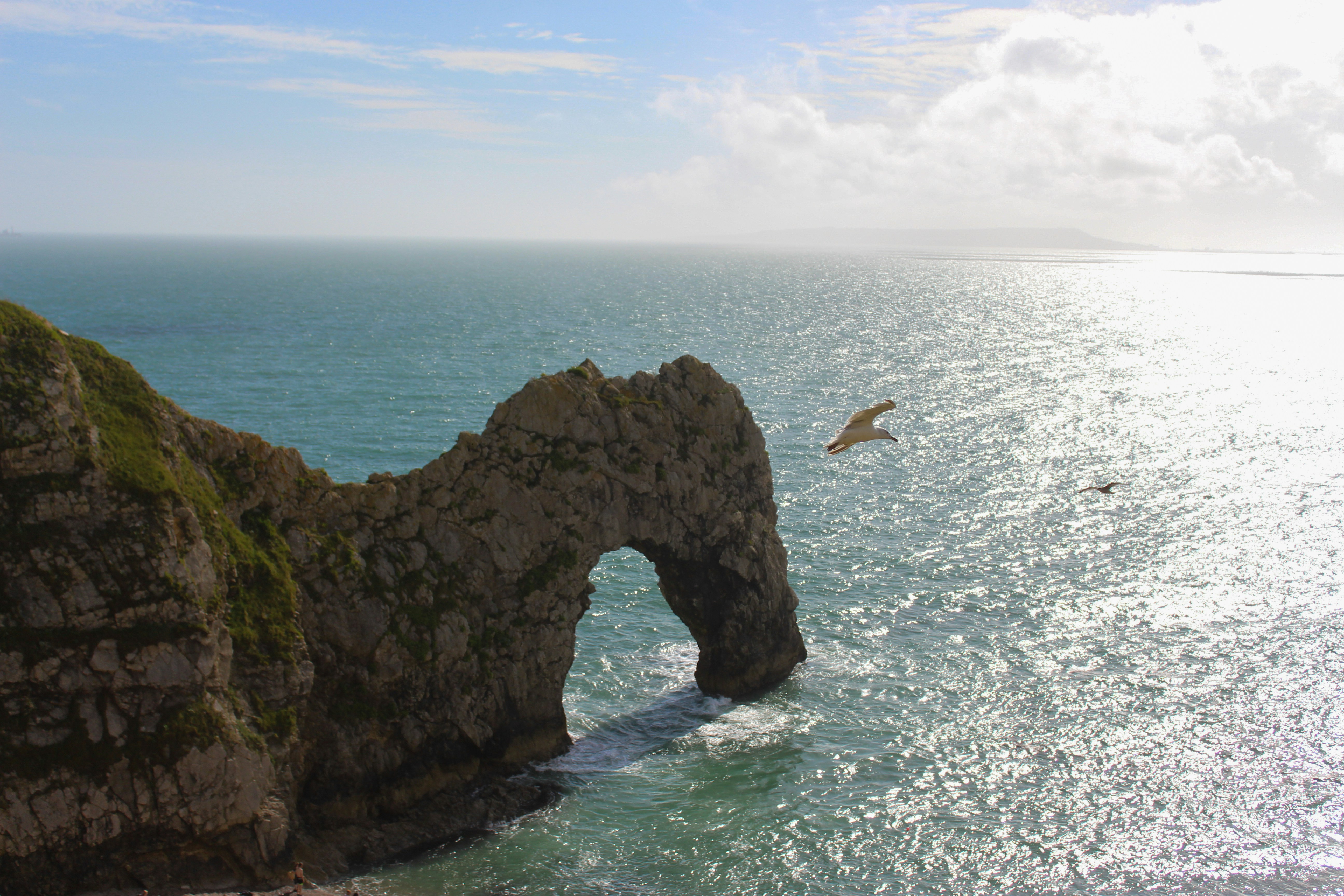 Arch of Light: Seascape Over the Emerald Arch