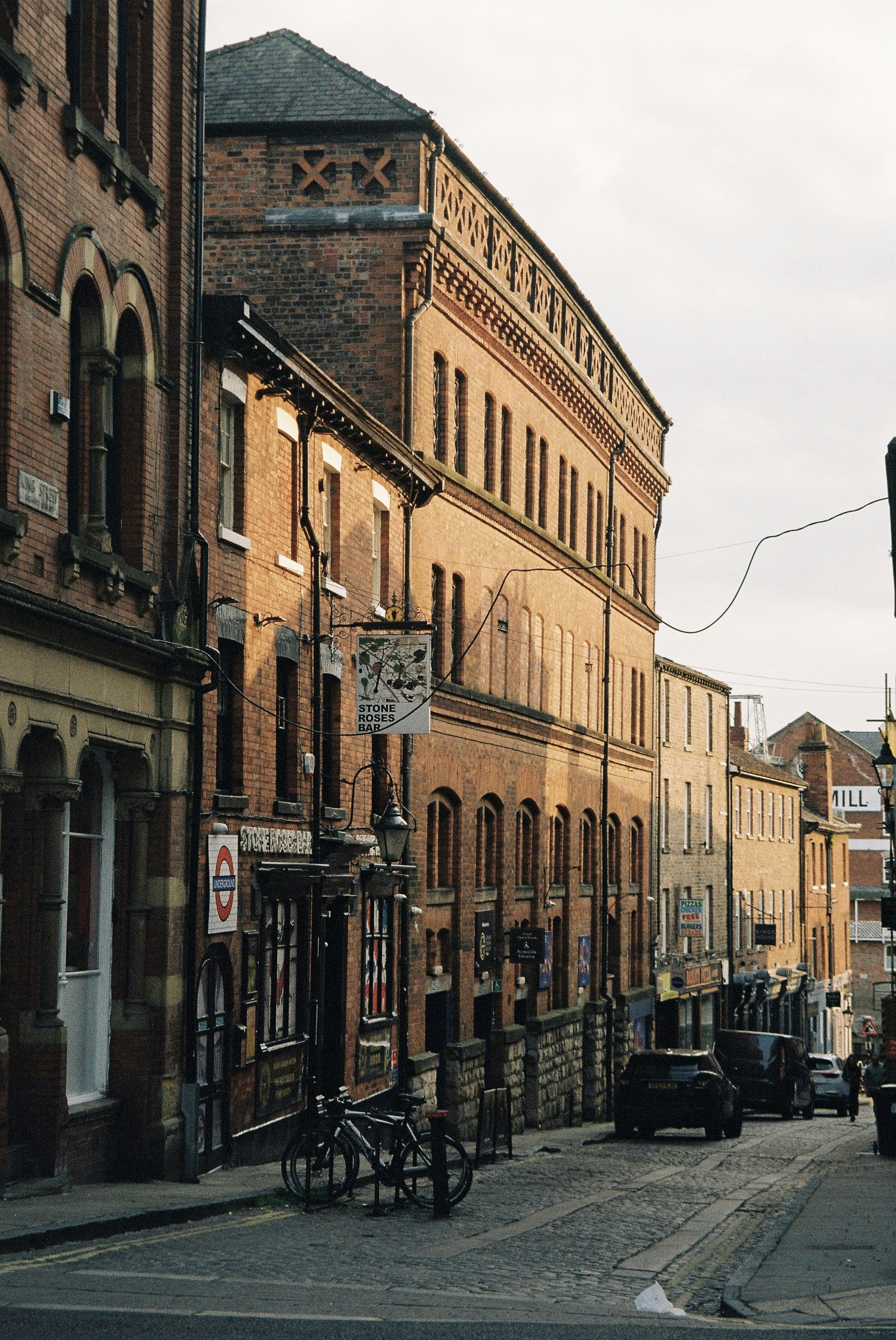 A city street lined with tall brick buildings photo – Free Edinburgh ...