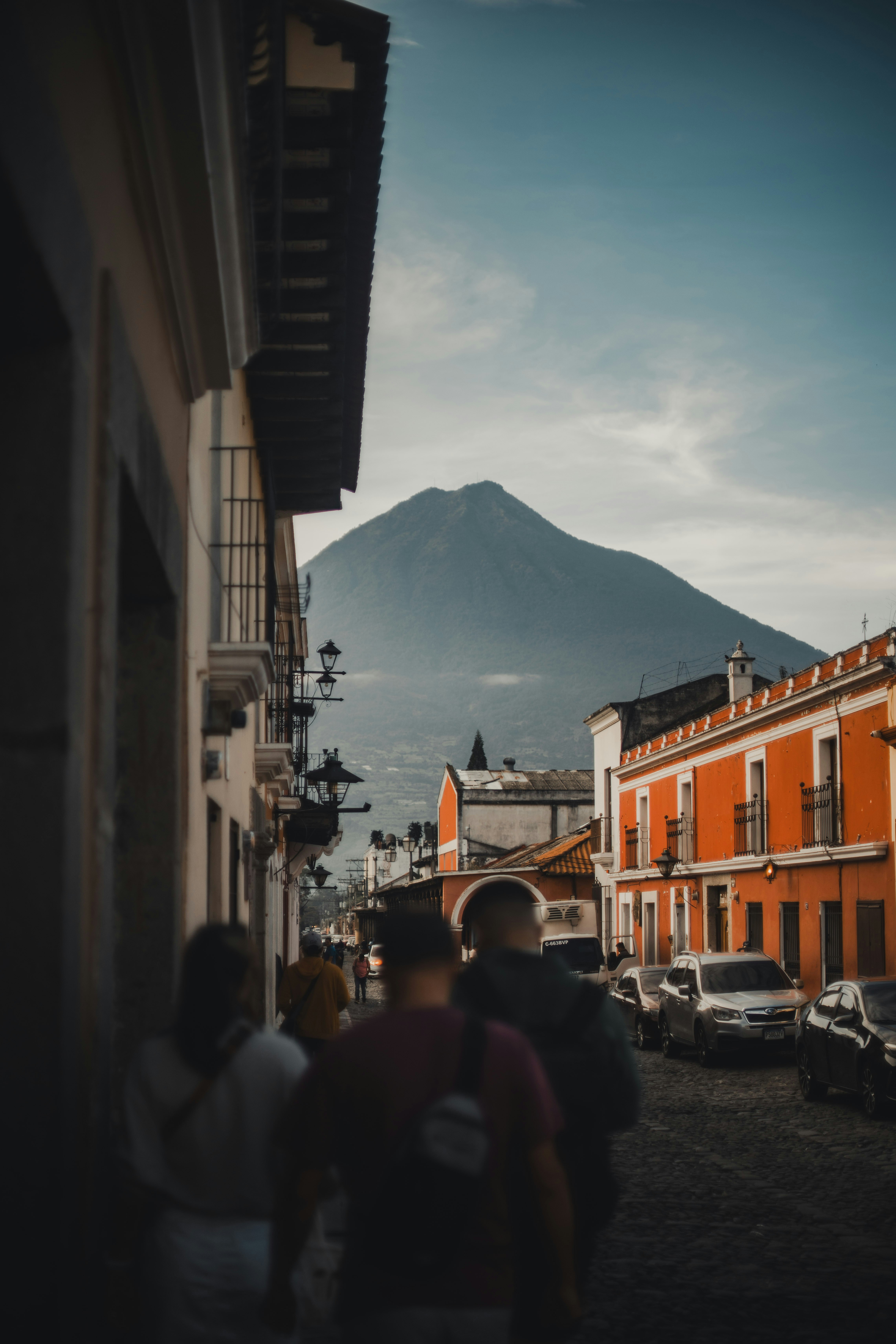 Volcano Veil Over a Sunlit Colonial Street