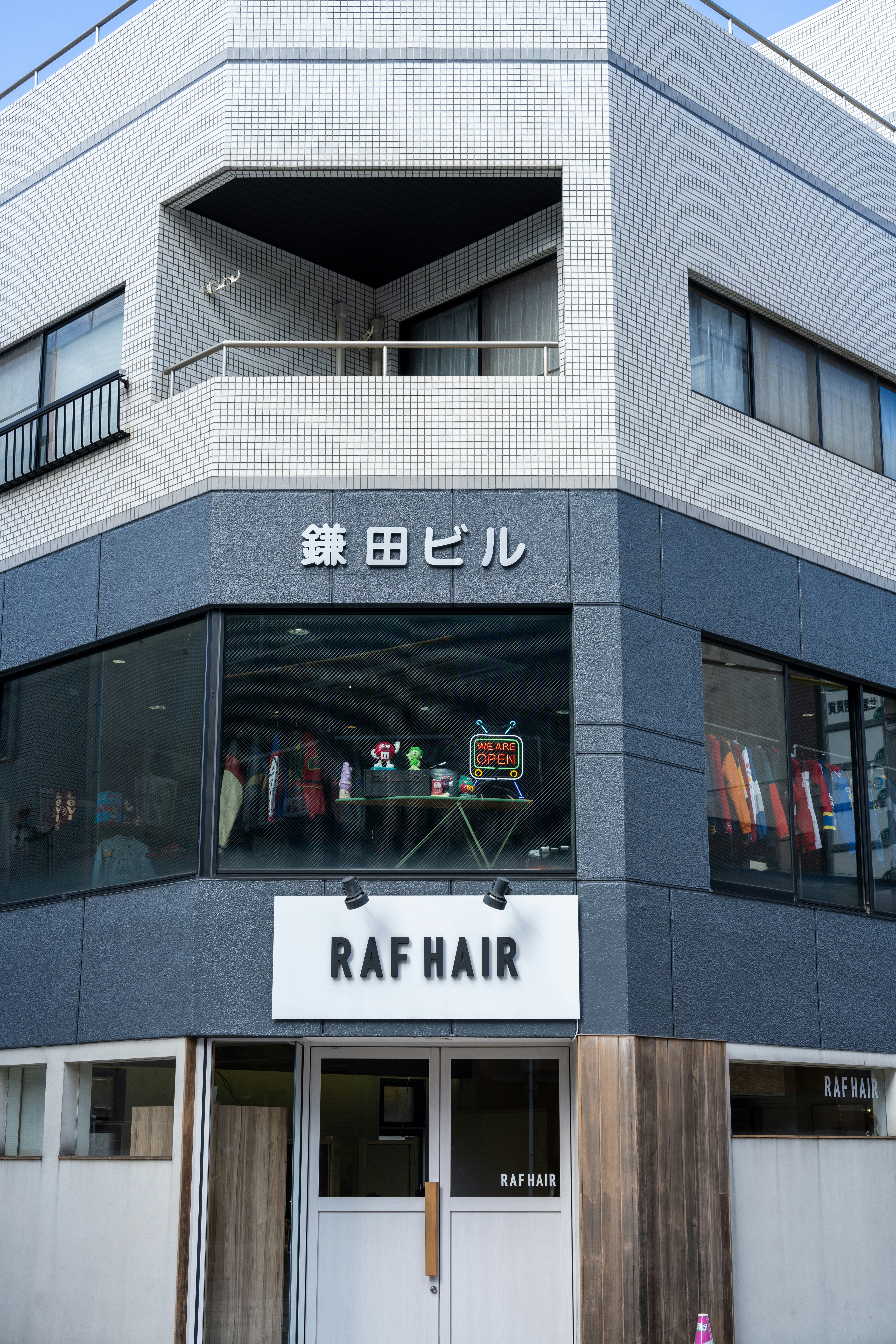 A building with a sign that says raf hair photo – Free Grey Image on ...