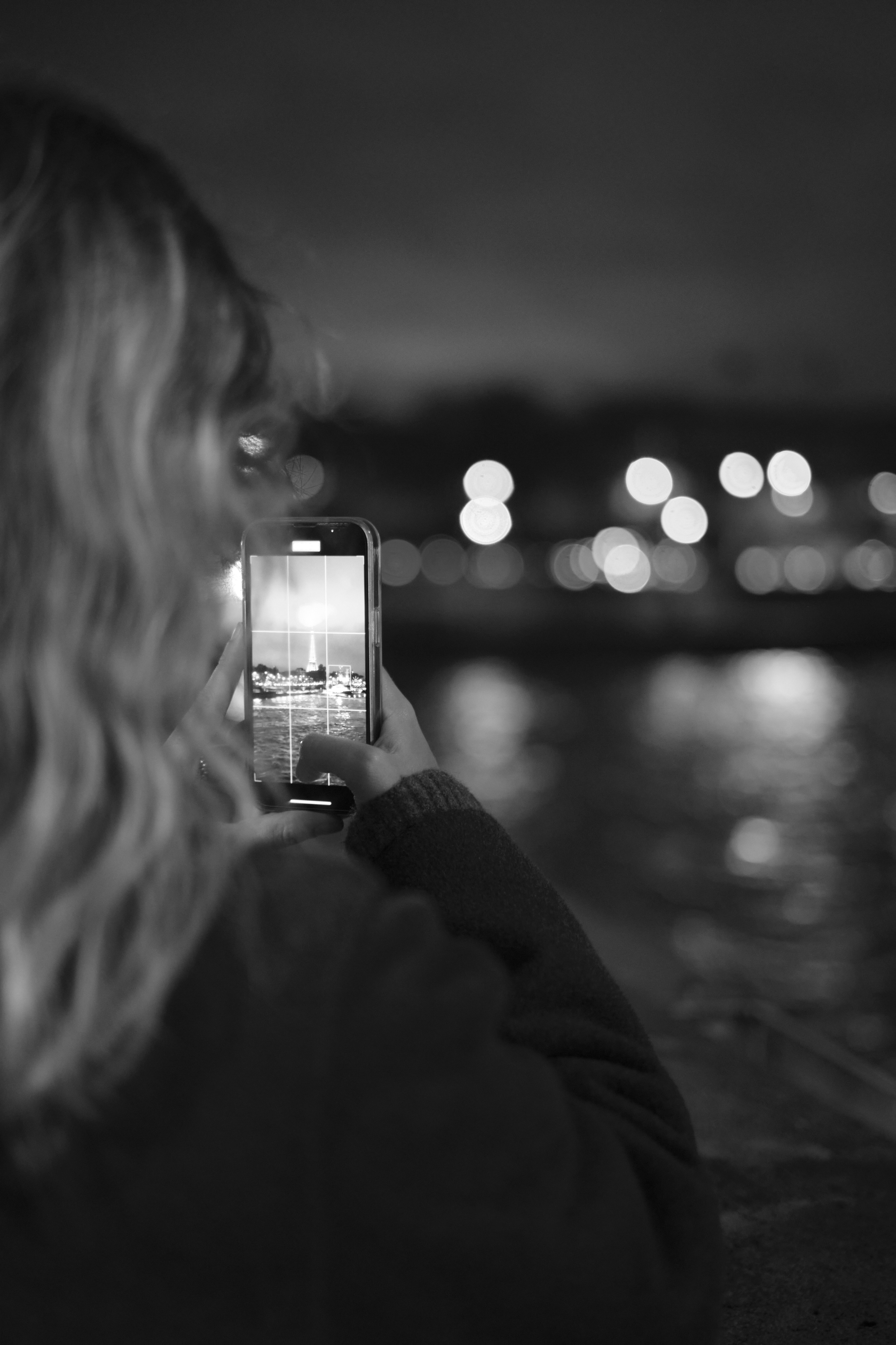 Night by the Water: Framing City Lights Through a Phone Screen