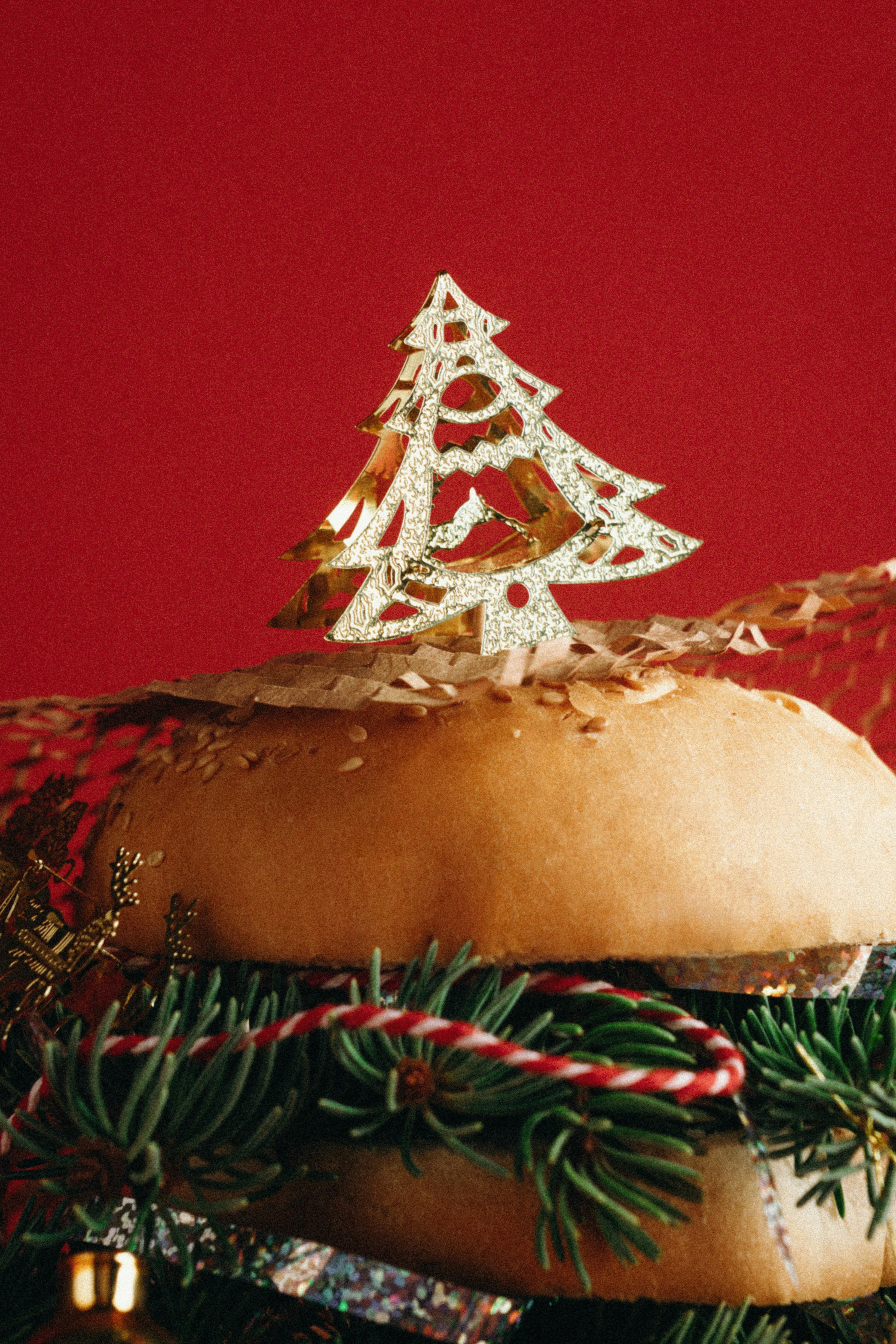 Glittering Christmas Tree Topper Above a Festive Bagel-like Bread Scene