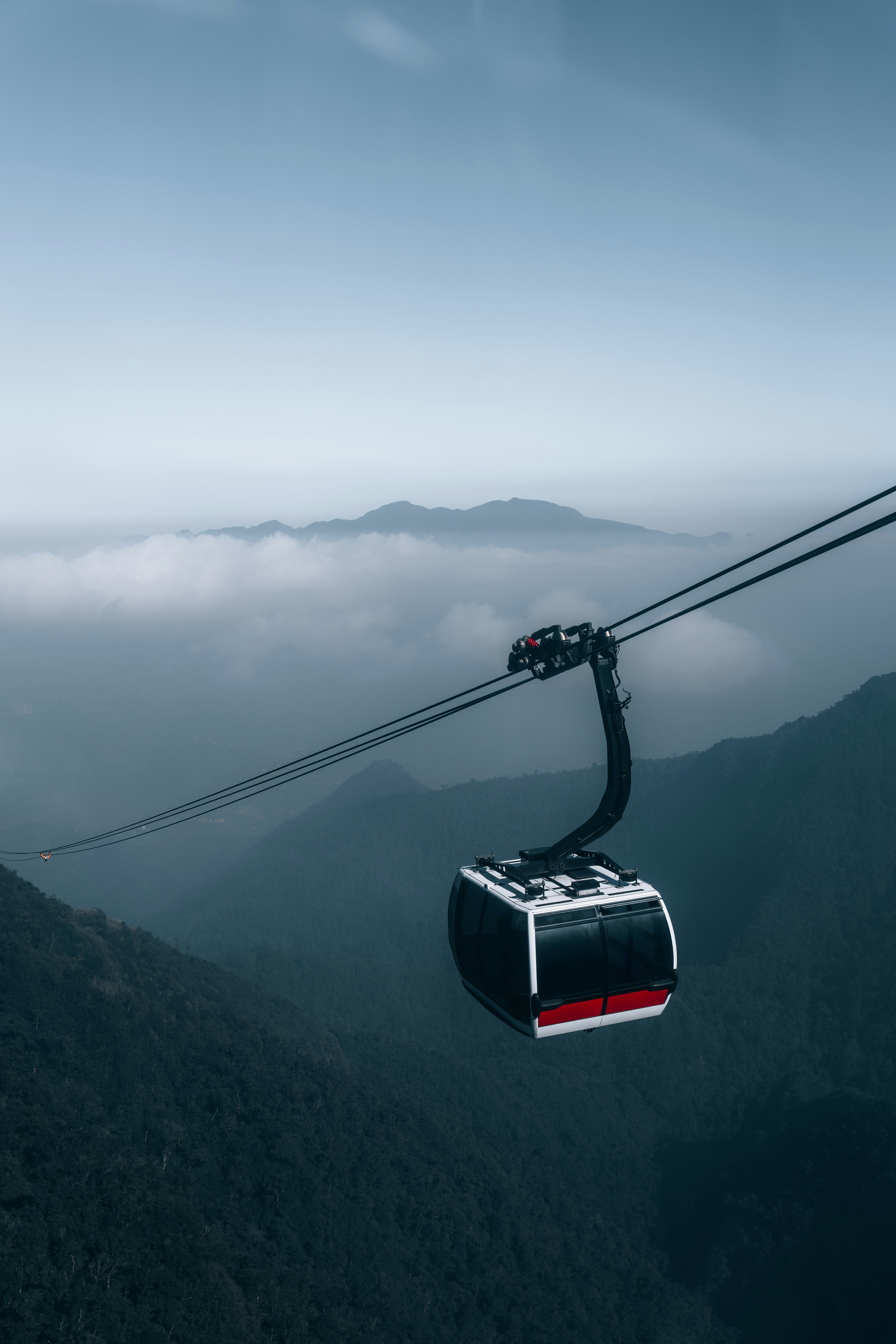 A cable car going up a mountain in the sky photo – Free Fansipan Image ...