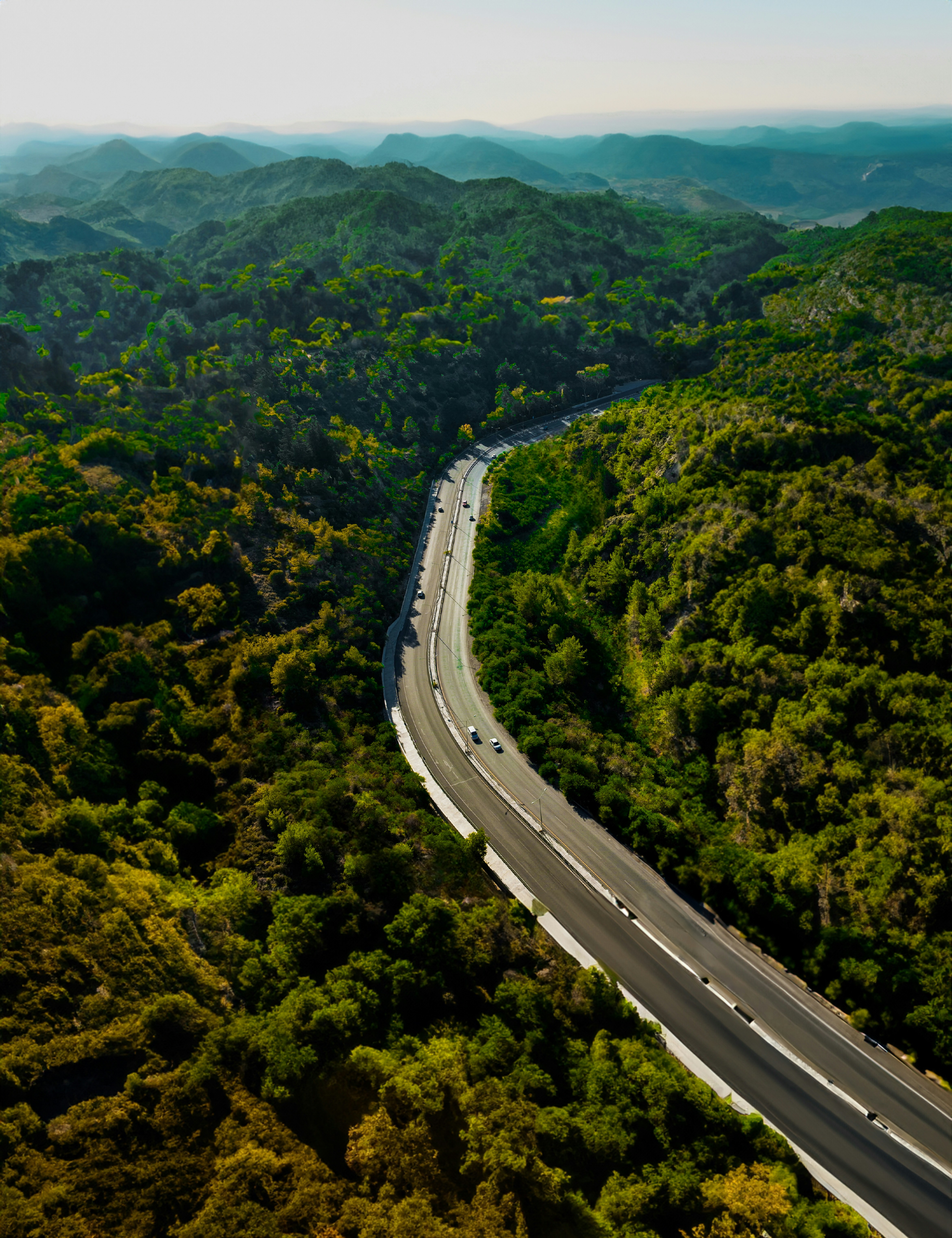 An aerial view of a highway surrounded by trees photo – Free Cyprus ...