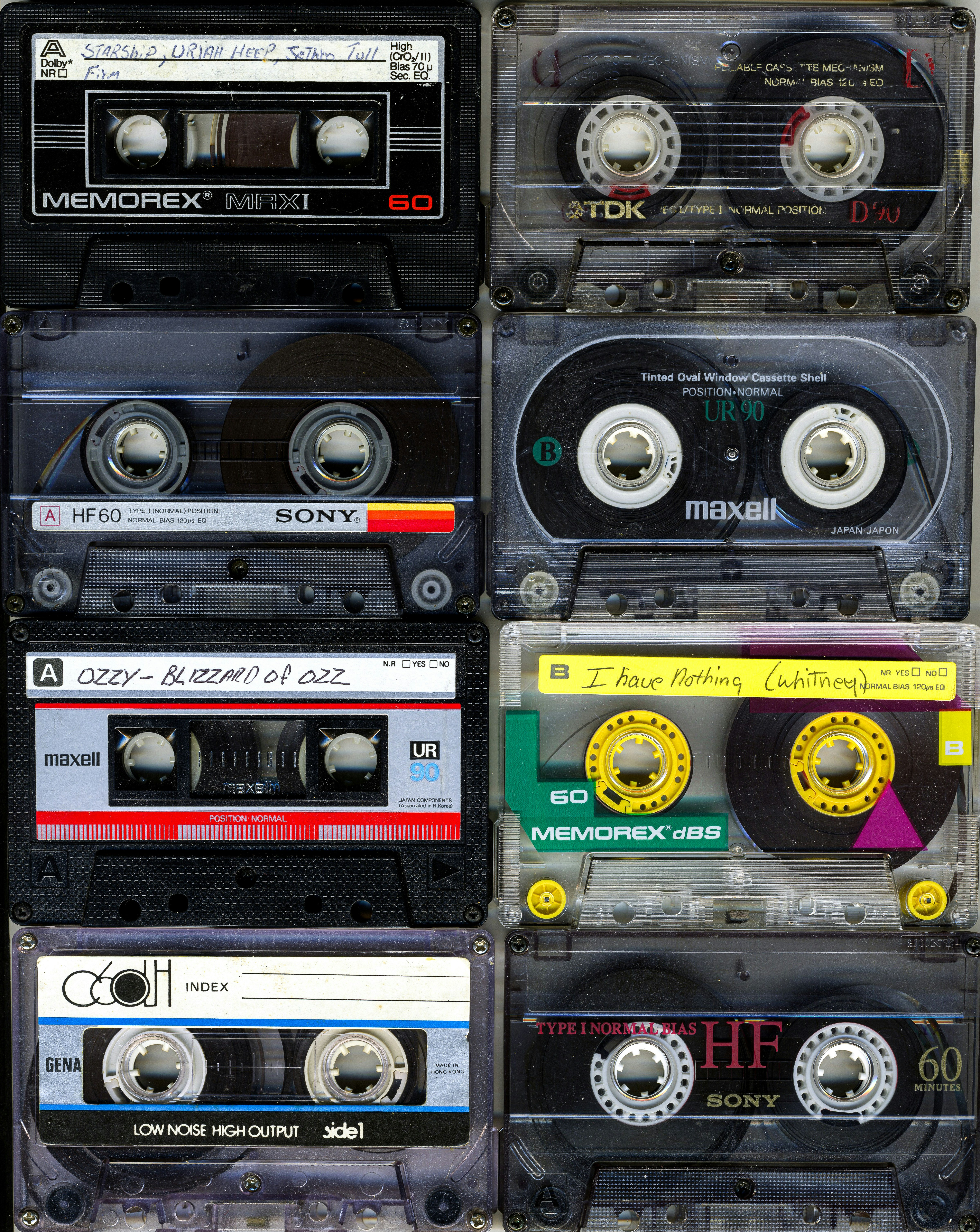 A collection of cassette tapes stacked on top of each other photo ...