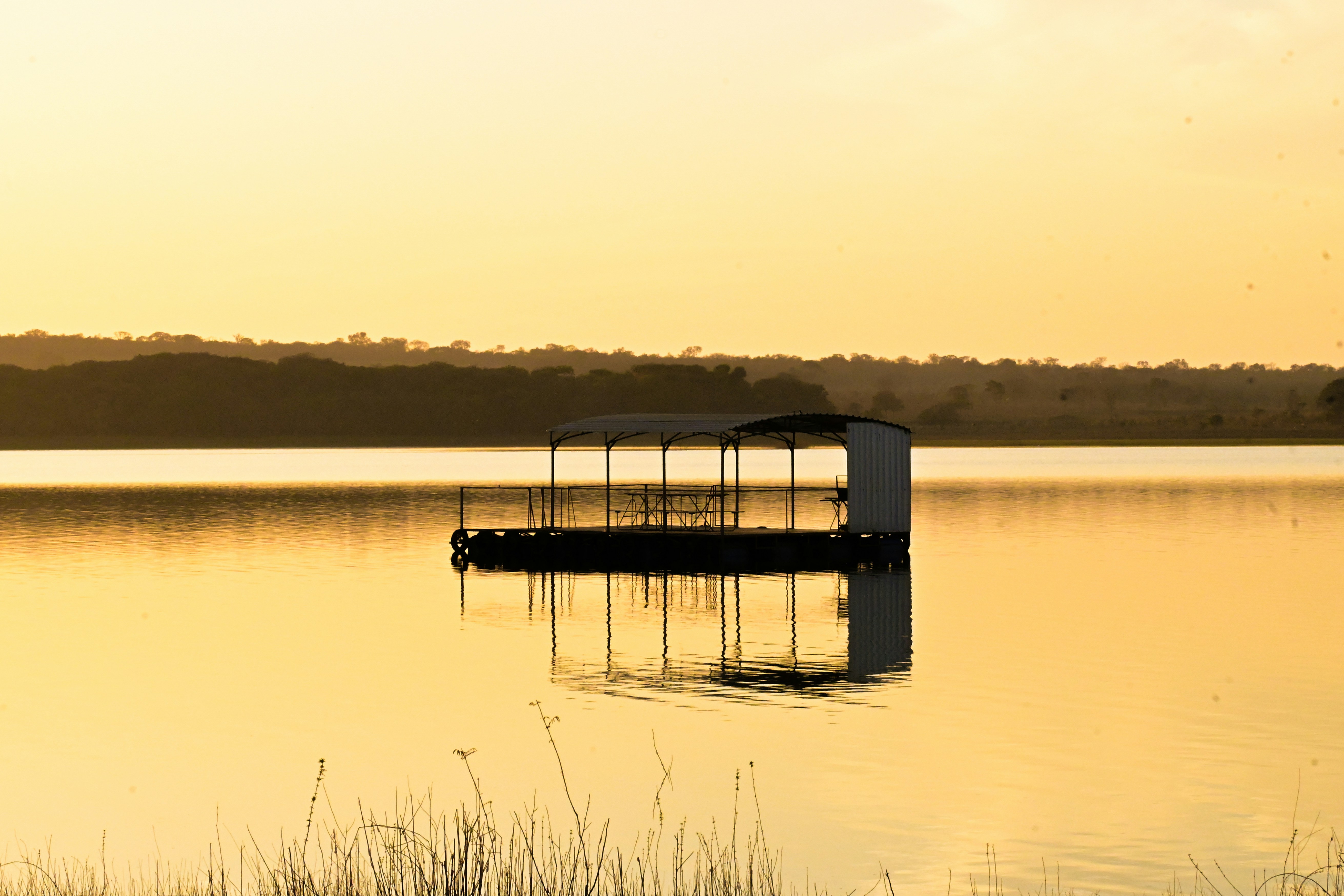 Golden Pier at Dusk: A Quiet Platform on Velvet Water