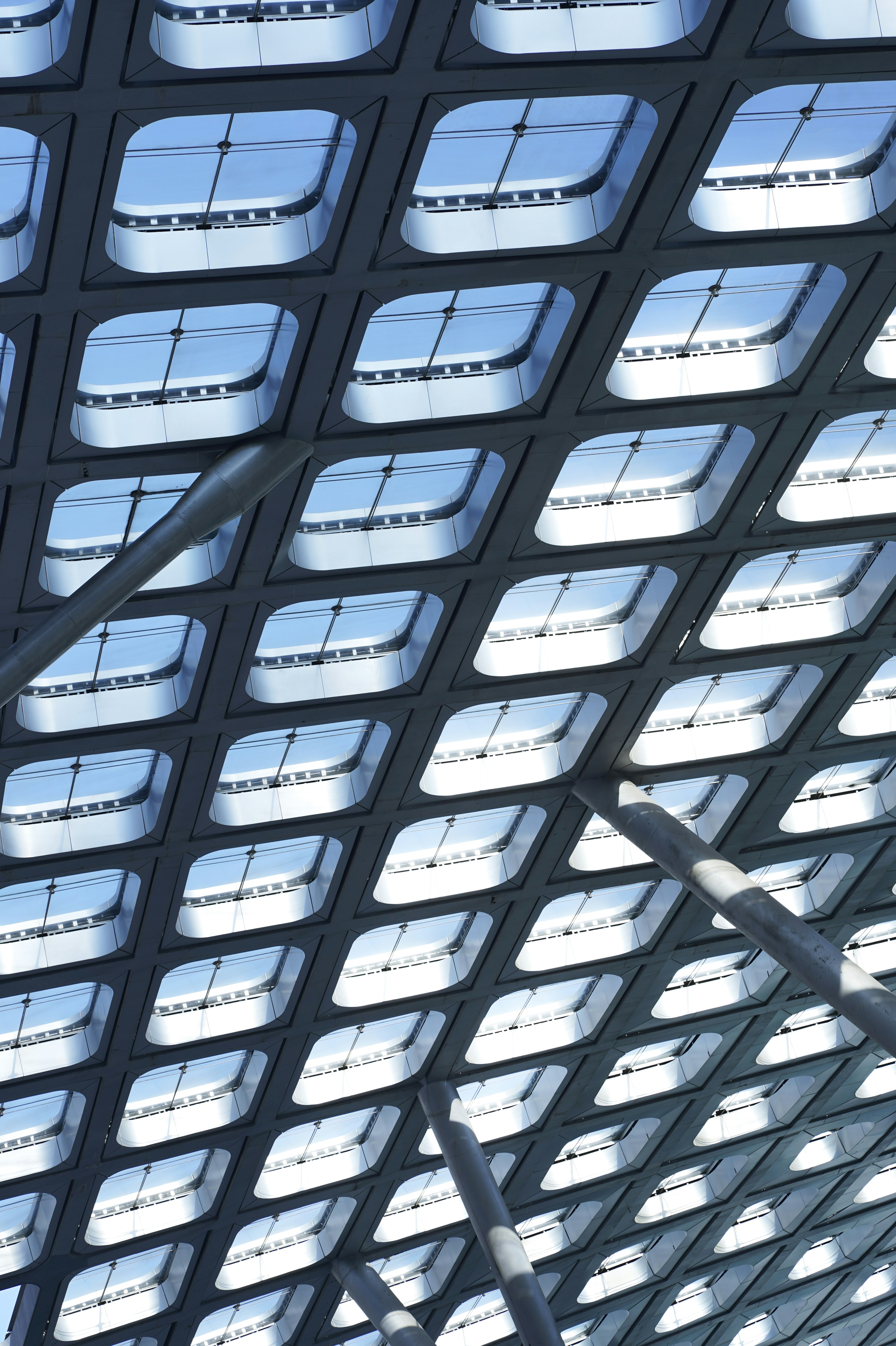 The ceiling of a train station with lots of windows photo – Free China ...