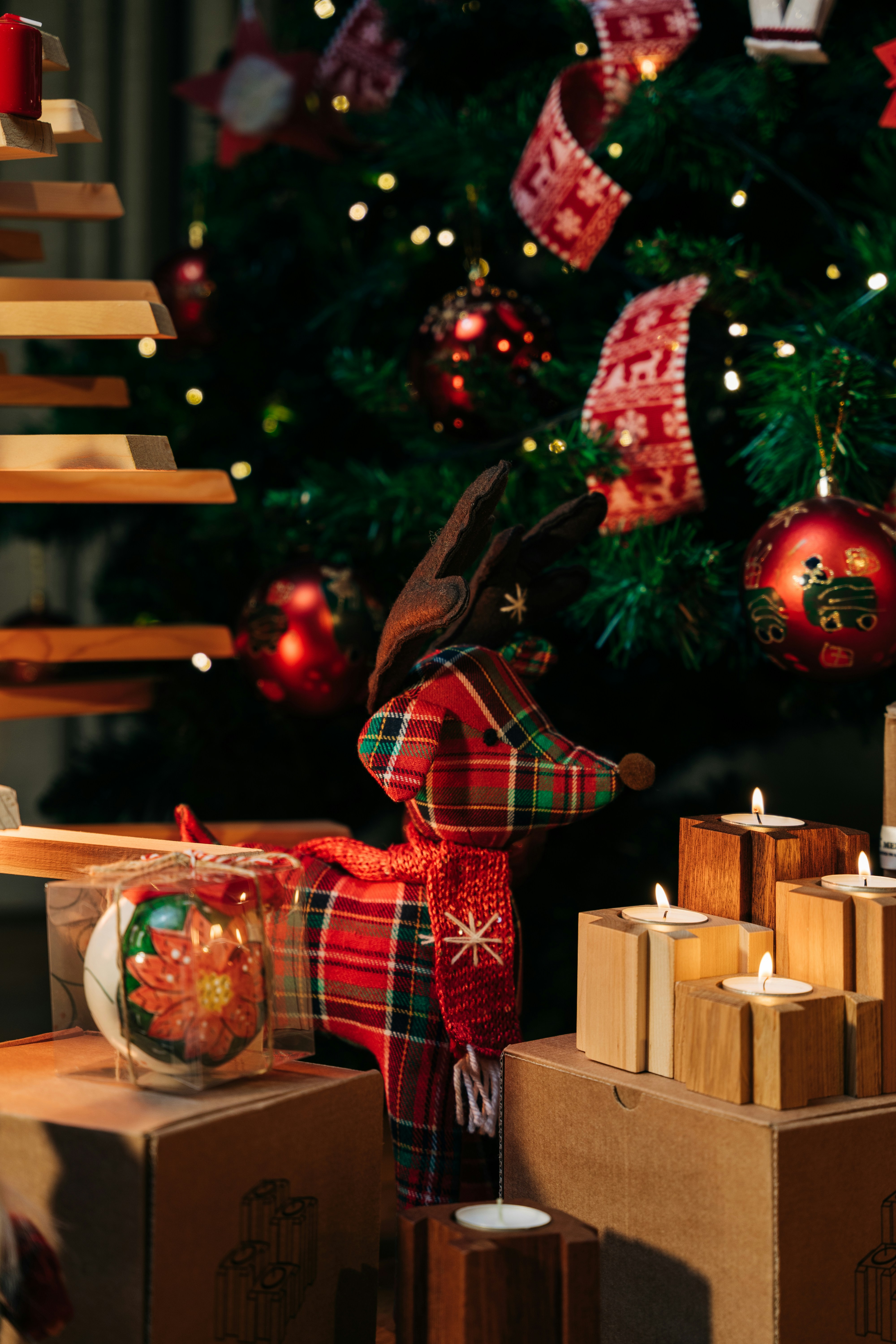 Plush Reindeer and Warm Candles: Christmas Quiet Underneath the Tree