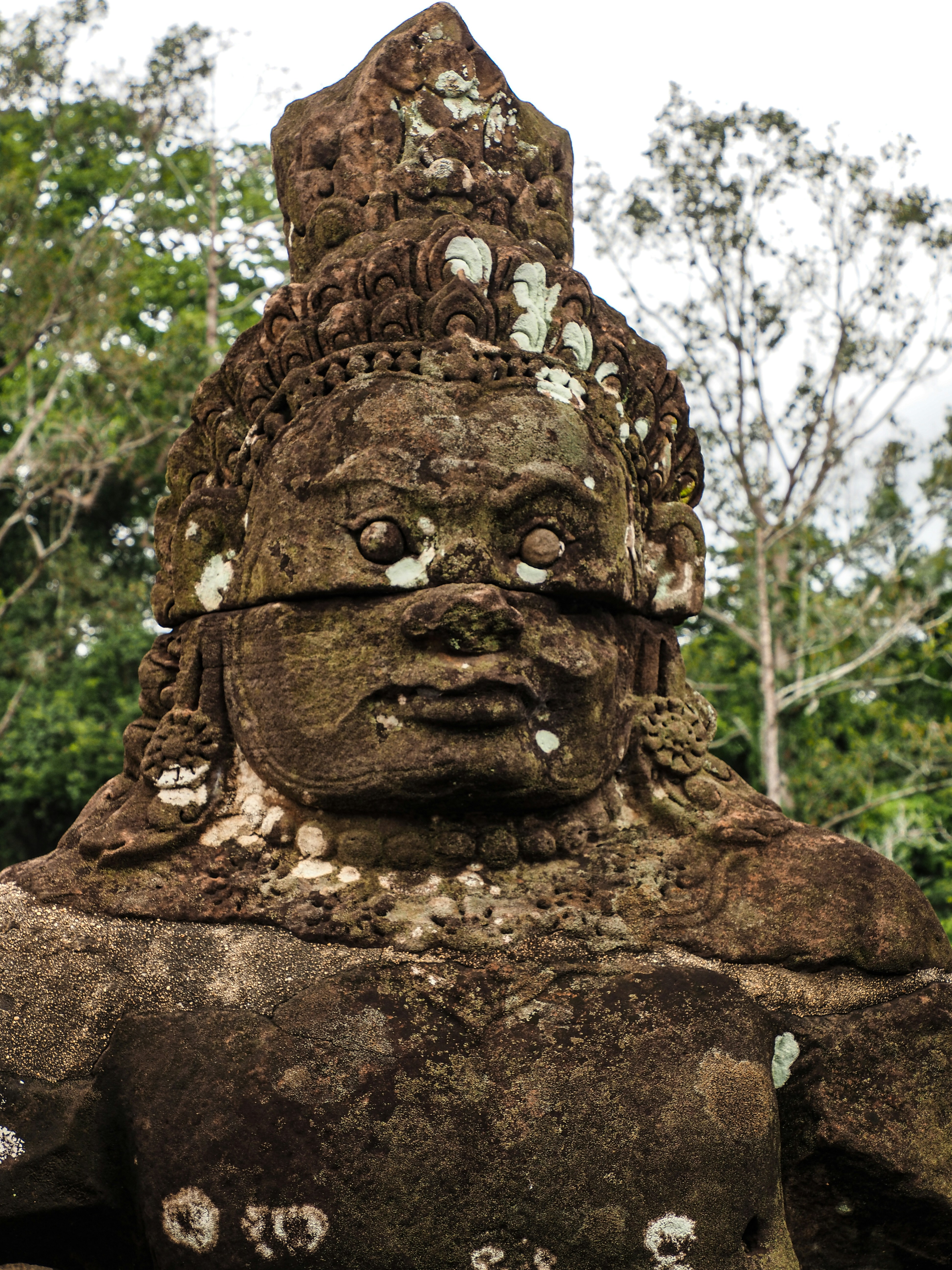 A statue of a person with a hat on photo – Free Angkor wat Image on ...