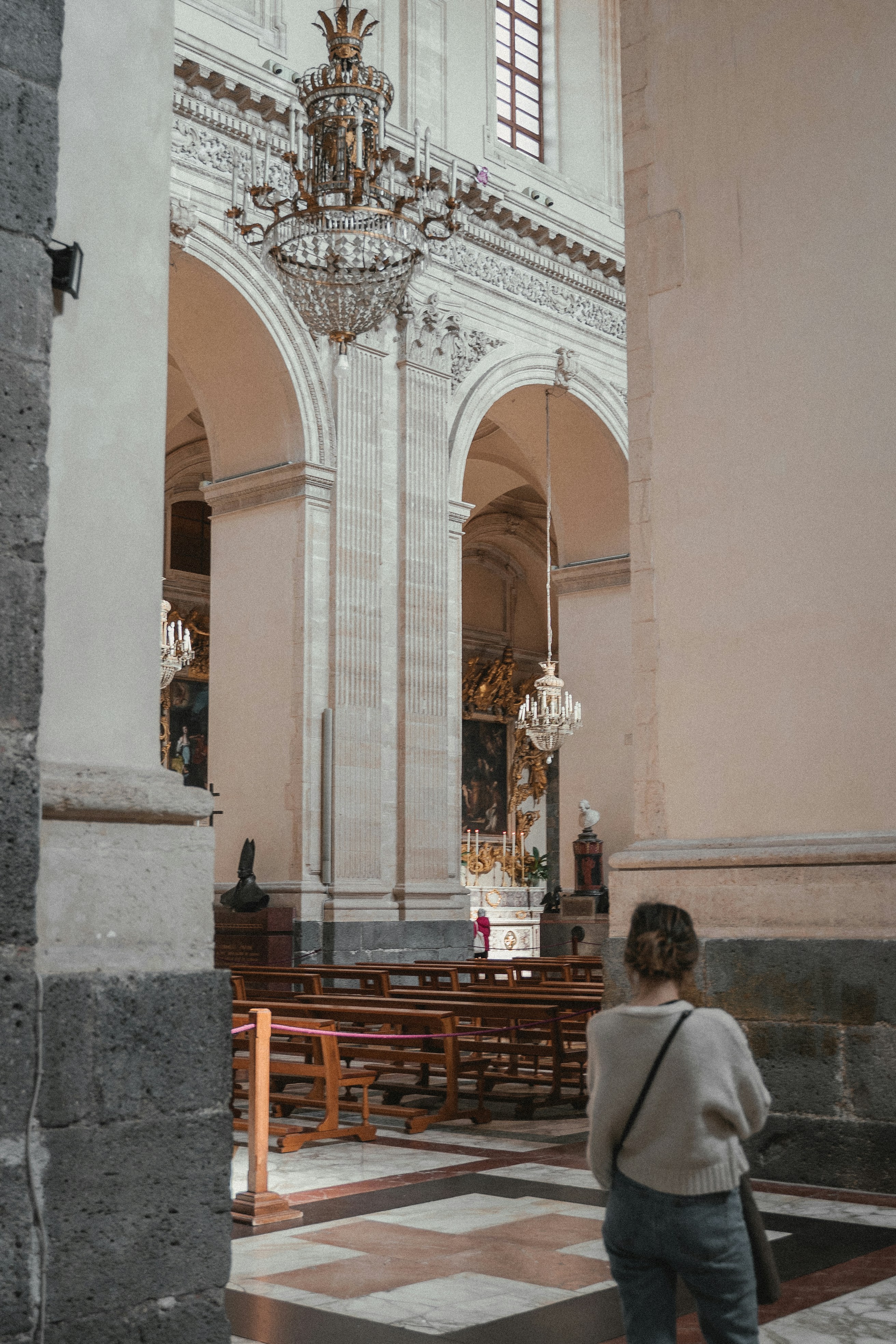Luminous Arches and a Silent Visitor in a Marble Nave