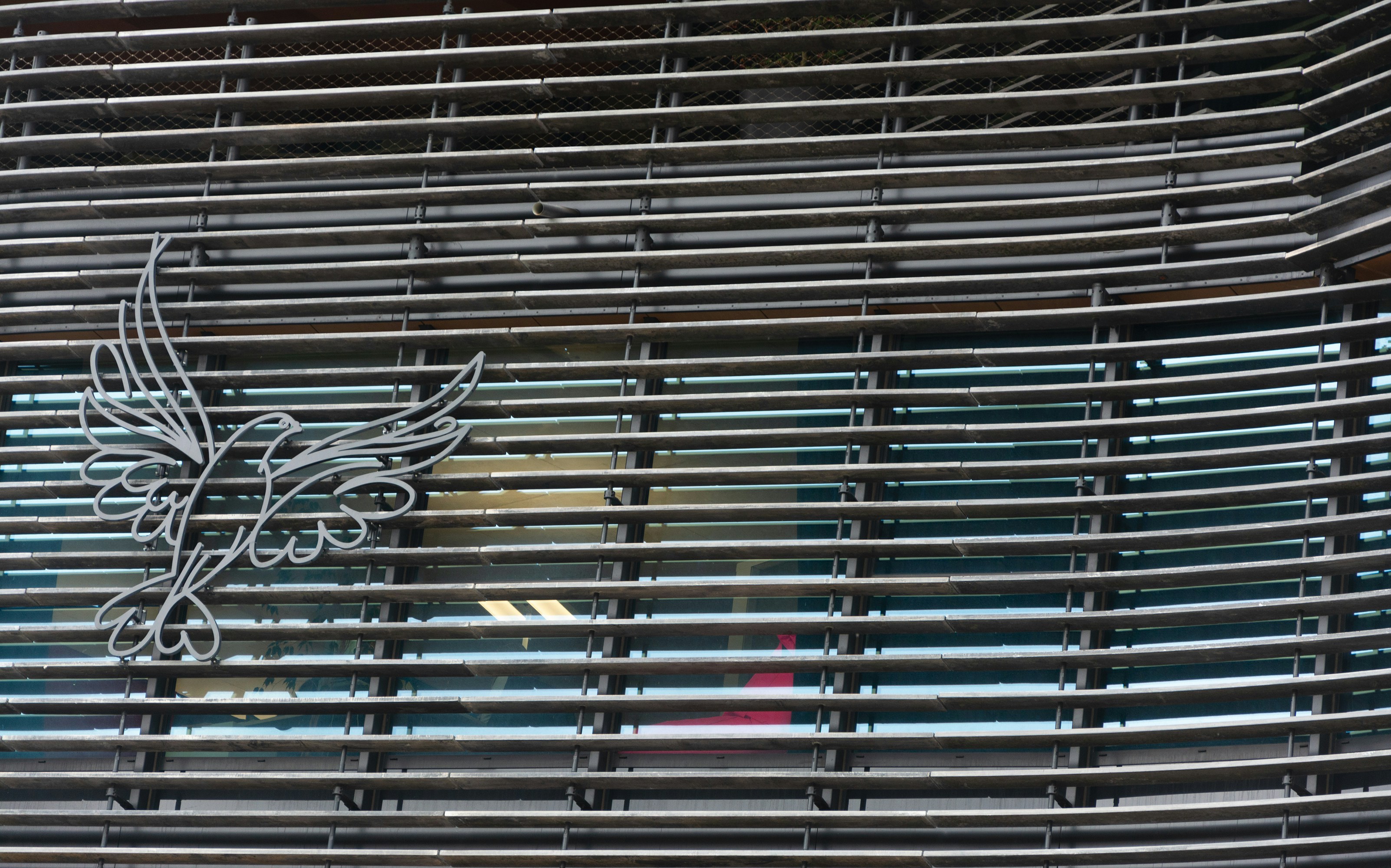 Winged Emblem Framed by Steel Lattice