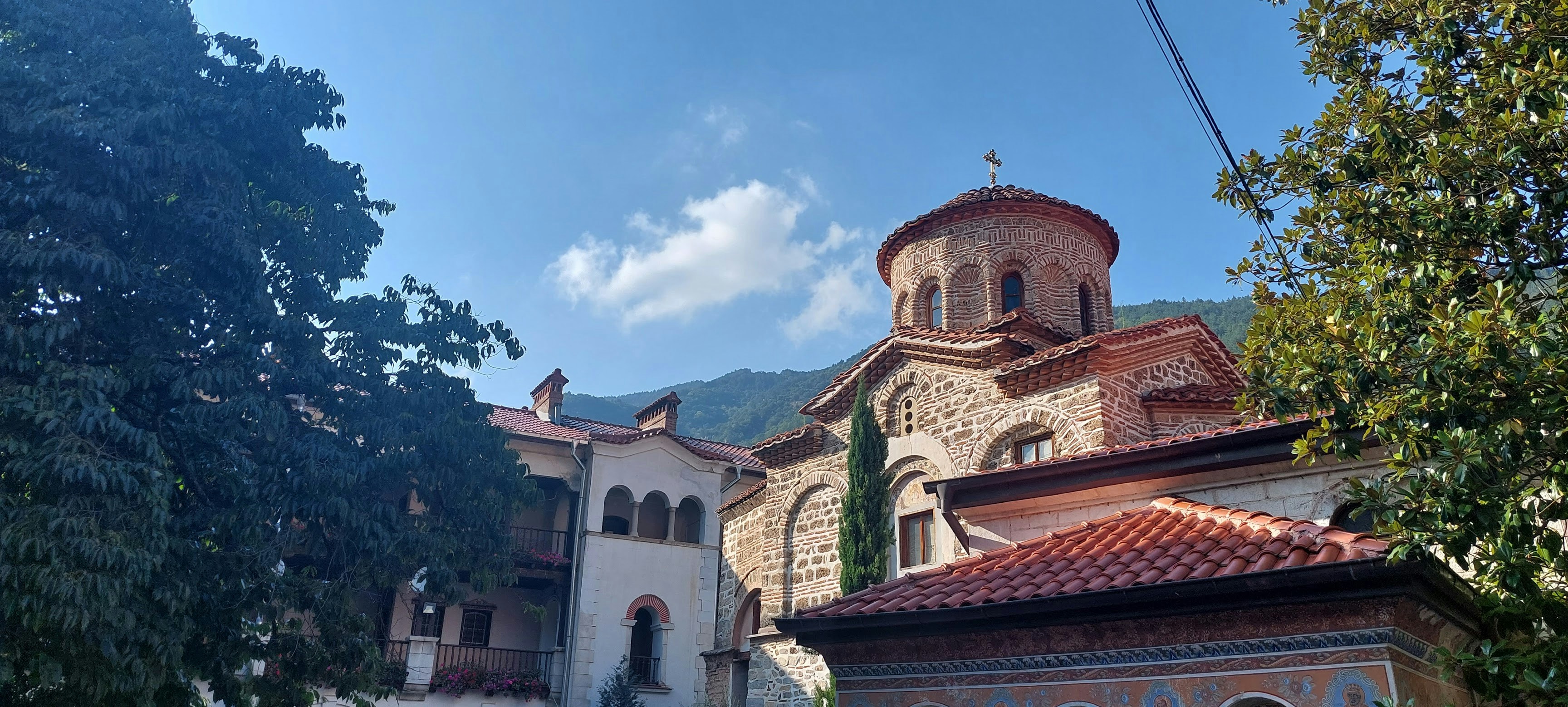 A church with a steeple and a clock tower photo – Free Monastery Image ...