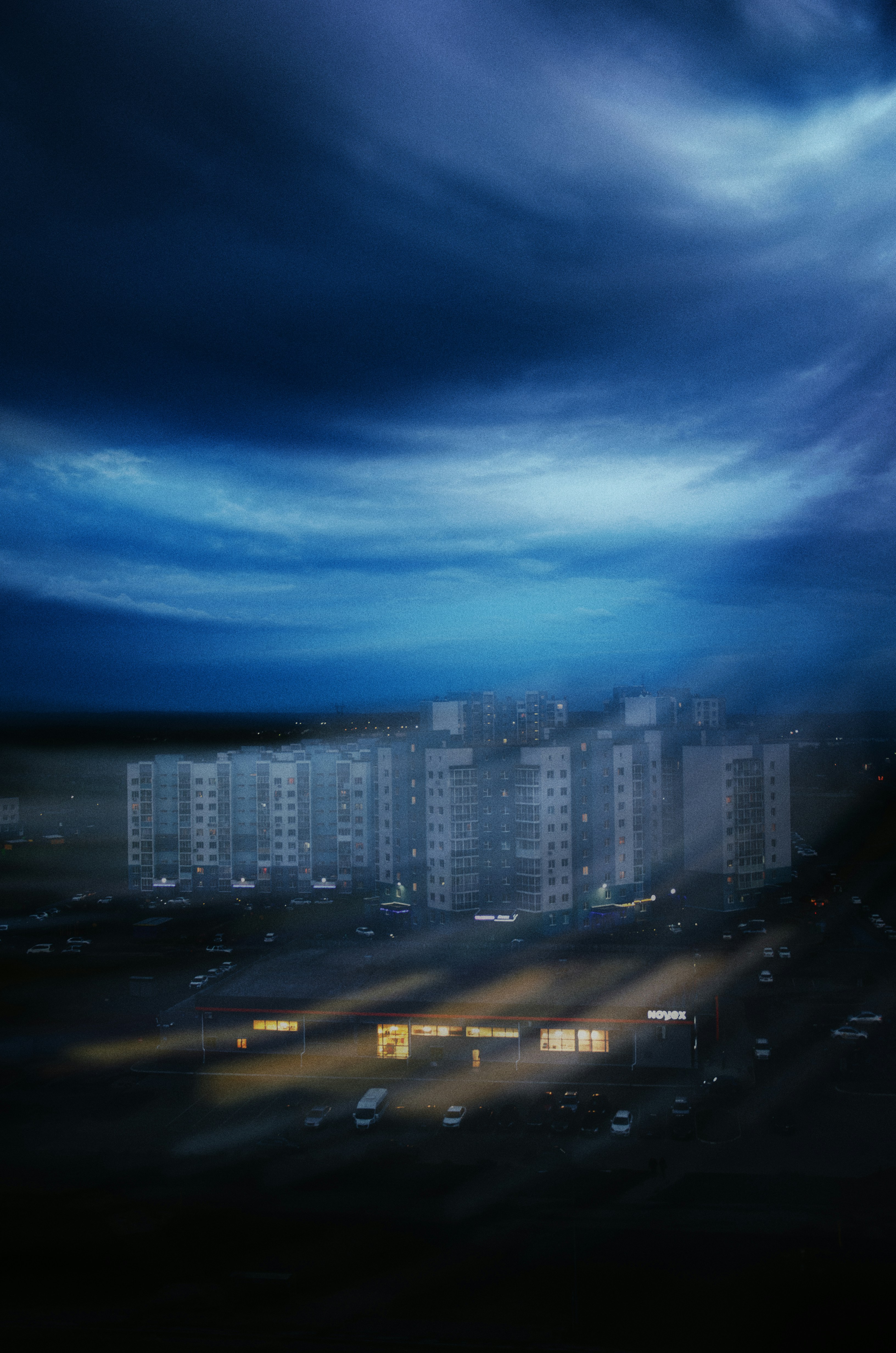 Twilight Towers: Quiet Corridor Beneath a Veiled Sky