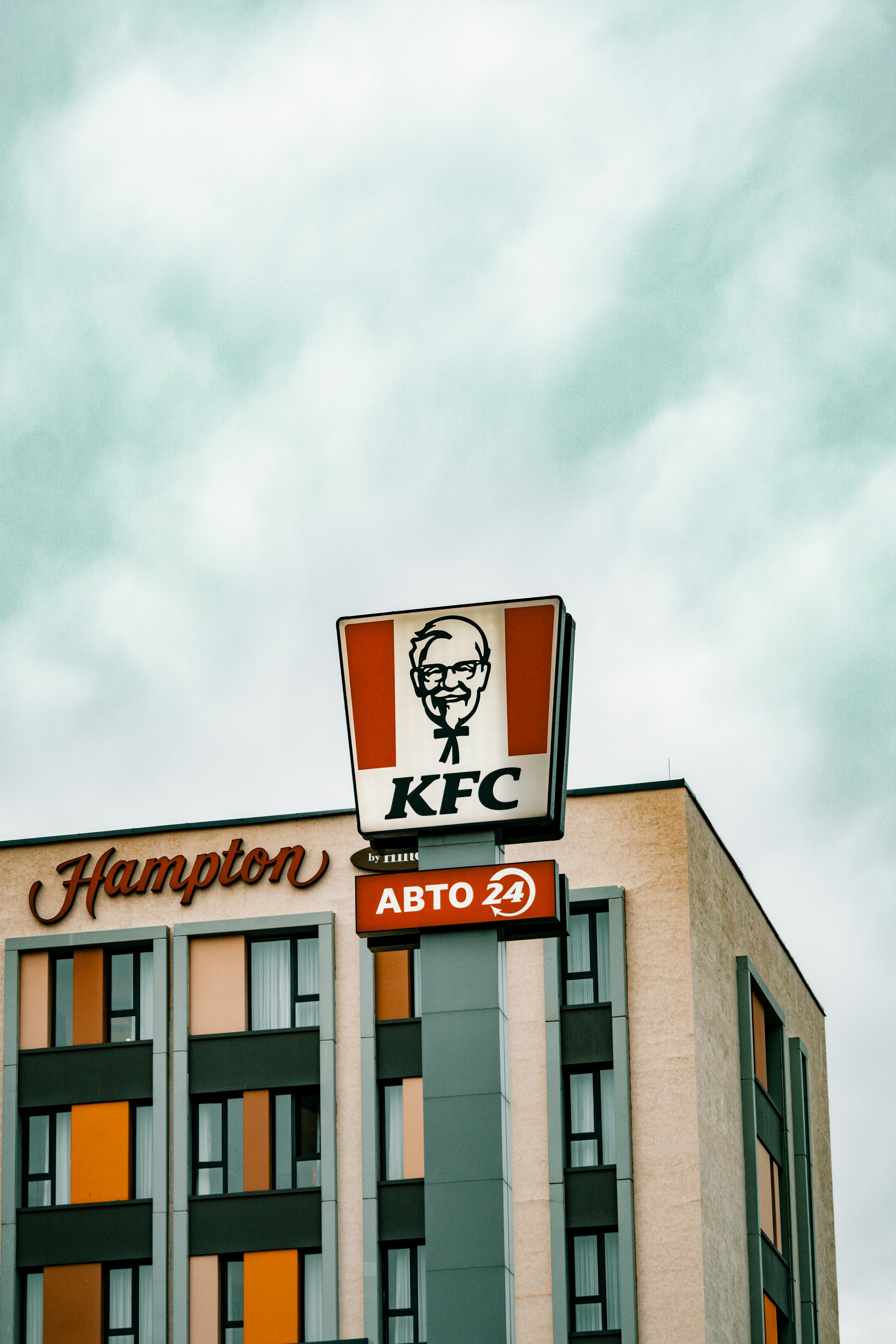 A picture of a kfc sign above a kfc building photo – Free Kfc Image on ...