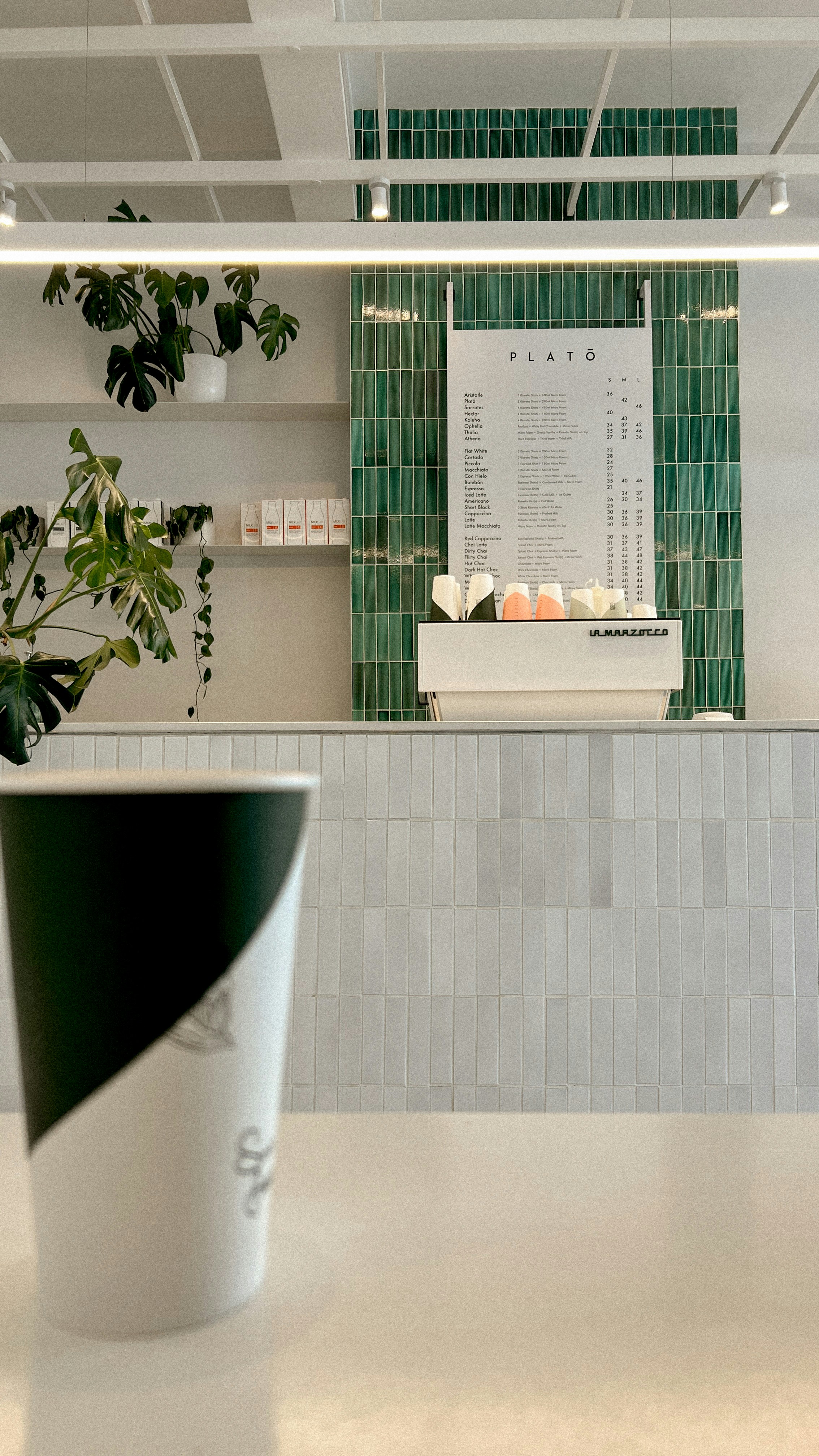 Green Tile Menu: Quiet Counter at a Modern Café