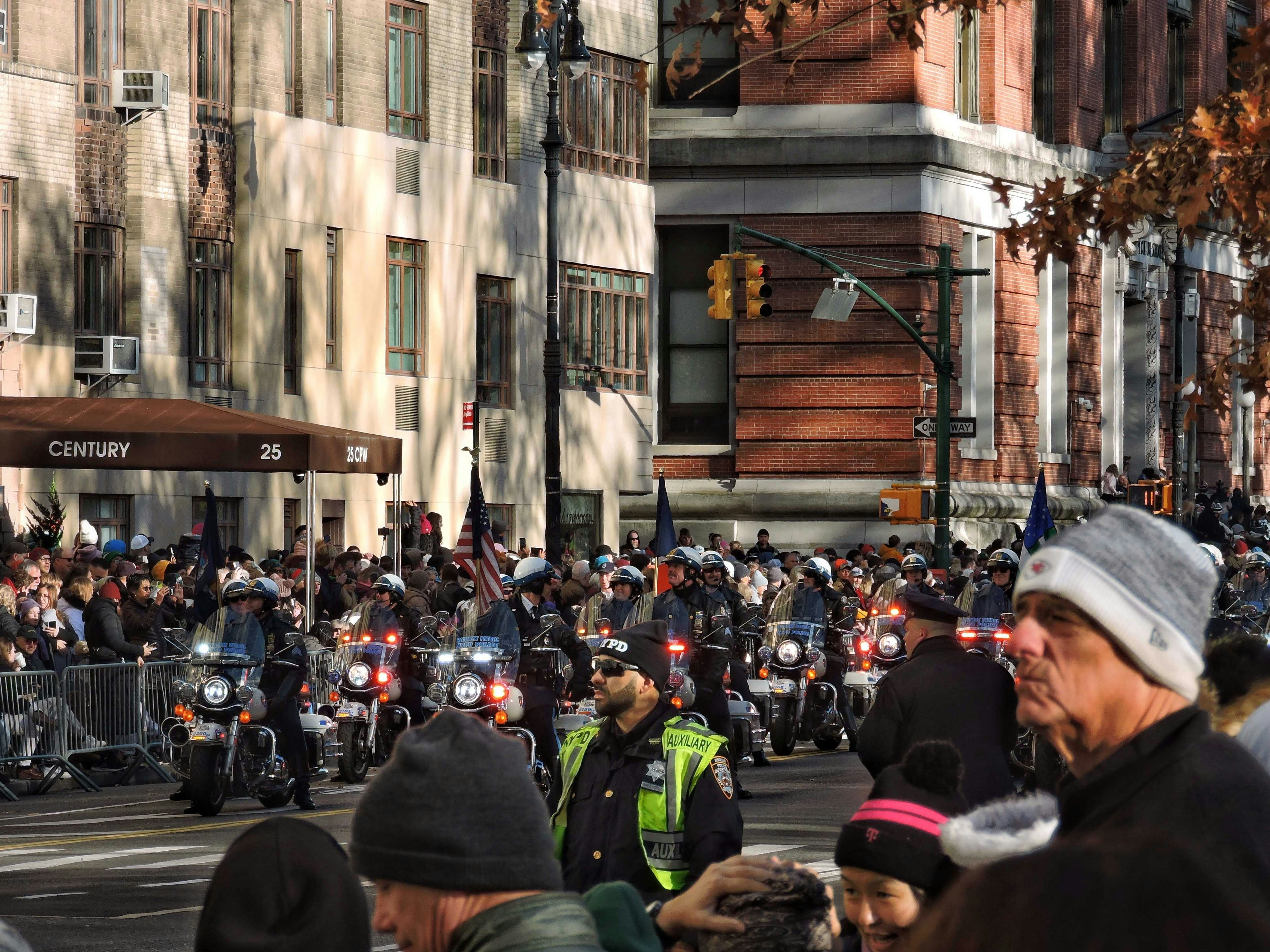 A large group of people riding motorcycles down a street photo – Free ...