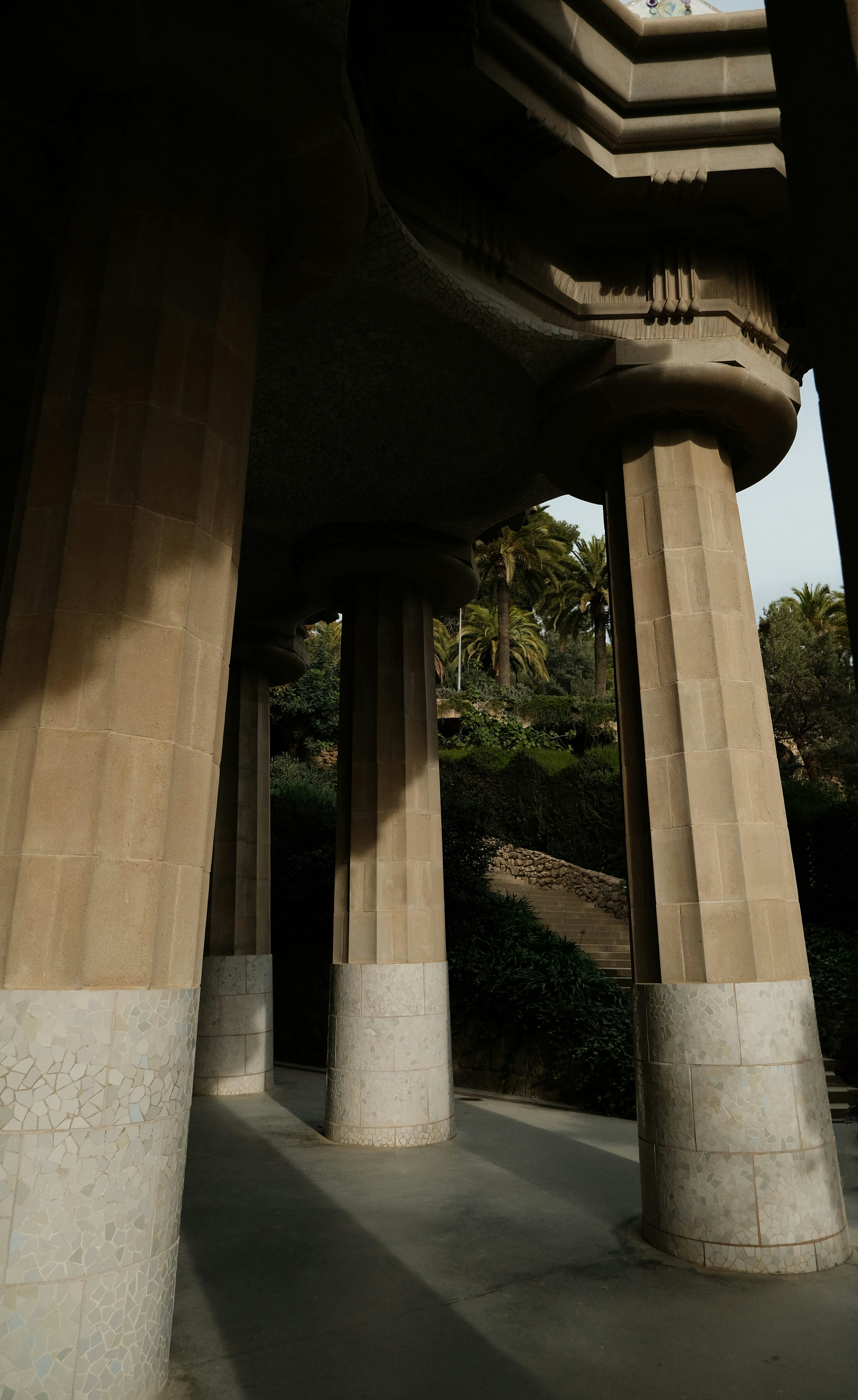 Underneath the Stone Colonnade: Echoes of Structure and Shadow