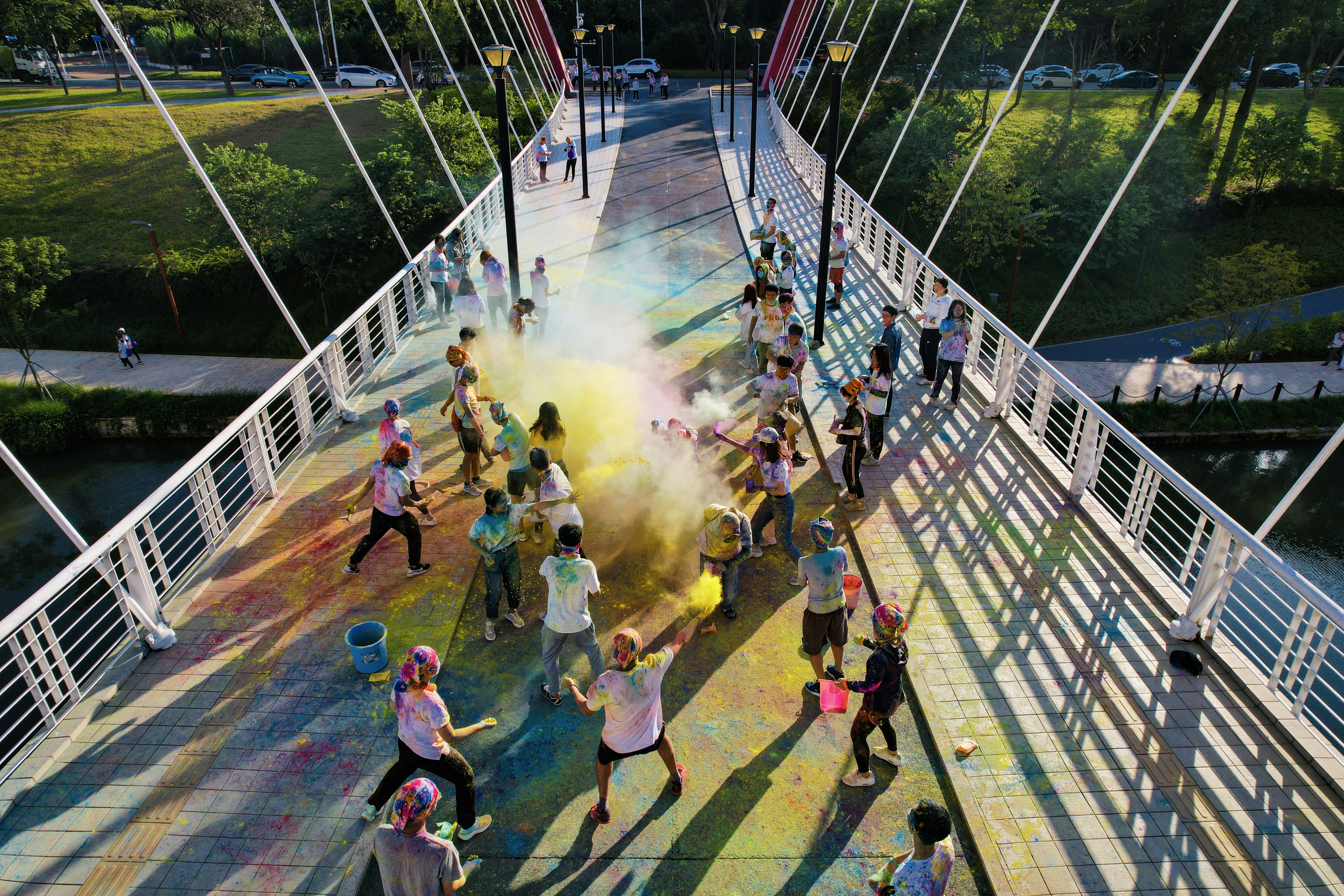 Chromatic Burst on a Suspension Bridge: A Color Powder Parade