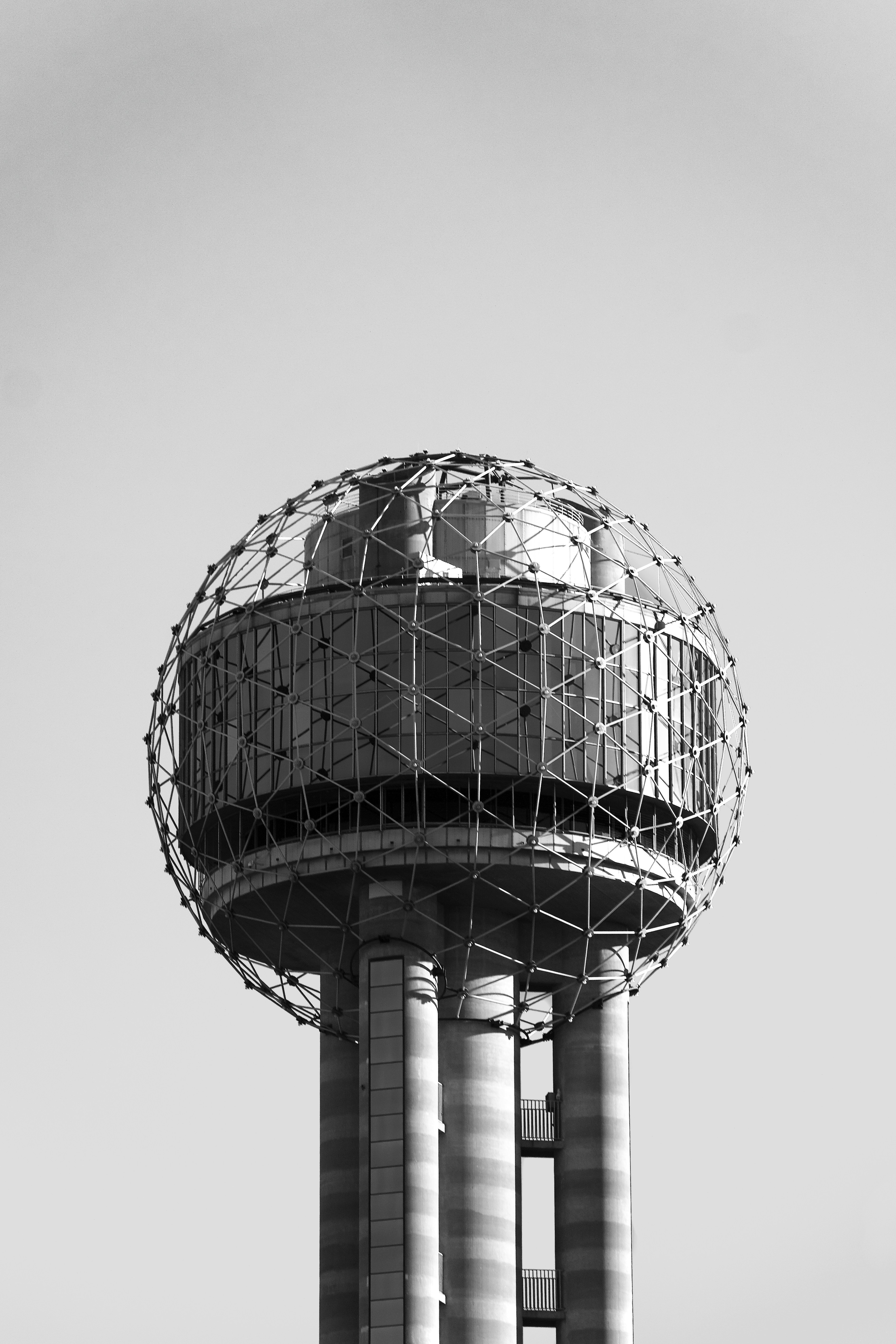 A very tall tower with a metal cage on top of it photo – Free Dallas ...